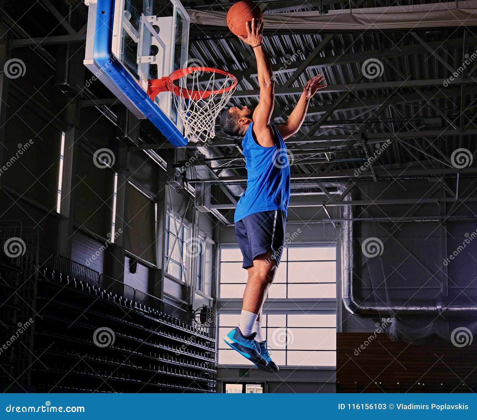 Professional Basketball Player in Action on a Basketball Field. Stock ...