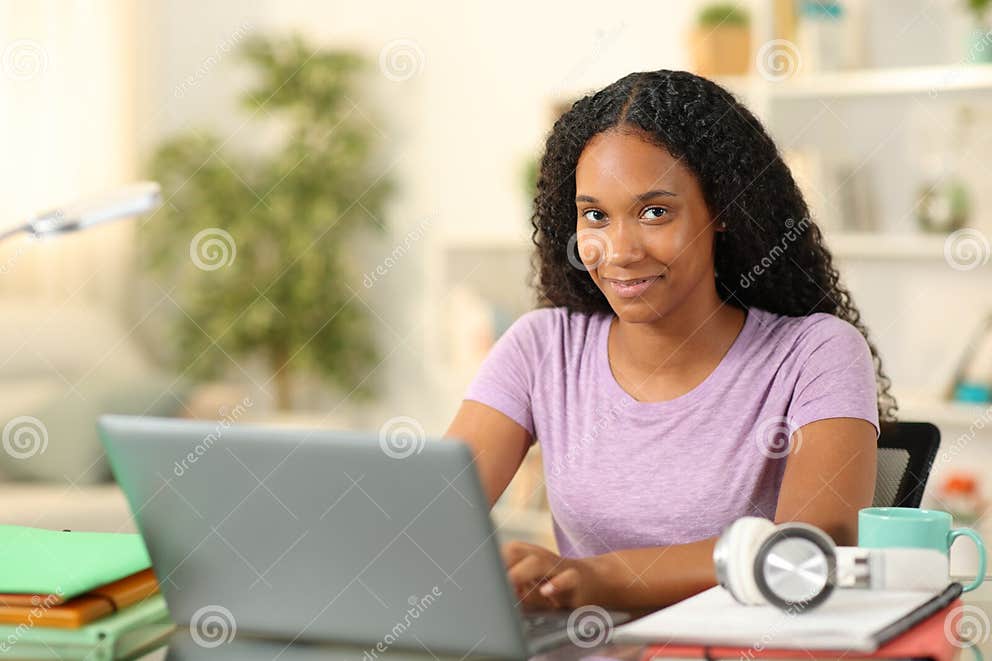 Black Proud Student Using Laptop Looking at Camera Stock Image - Image ...