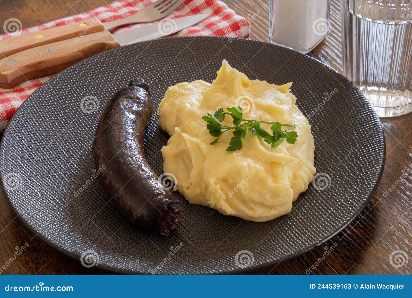 Black Pudding Cooked with Mashed Potatoes on a Plate Stock Image ...
