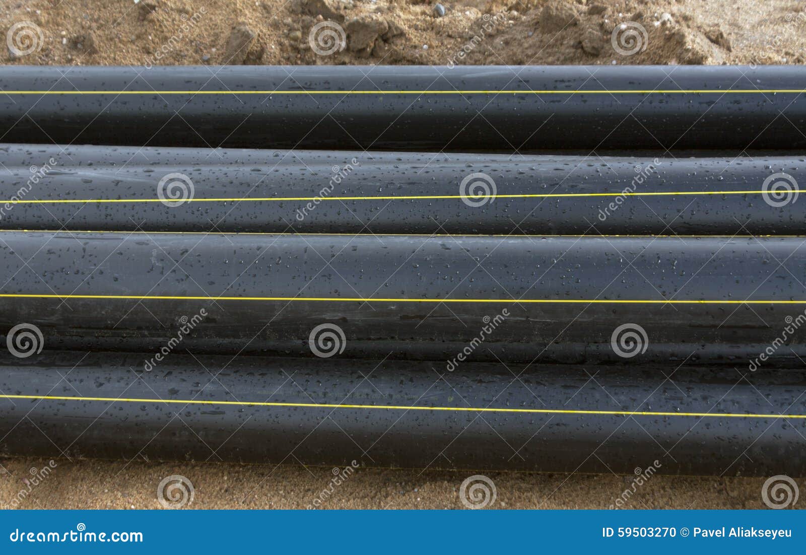 Black pvc tubes on sand. stock photo. Image of plumbing - 59503270