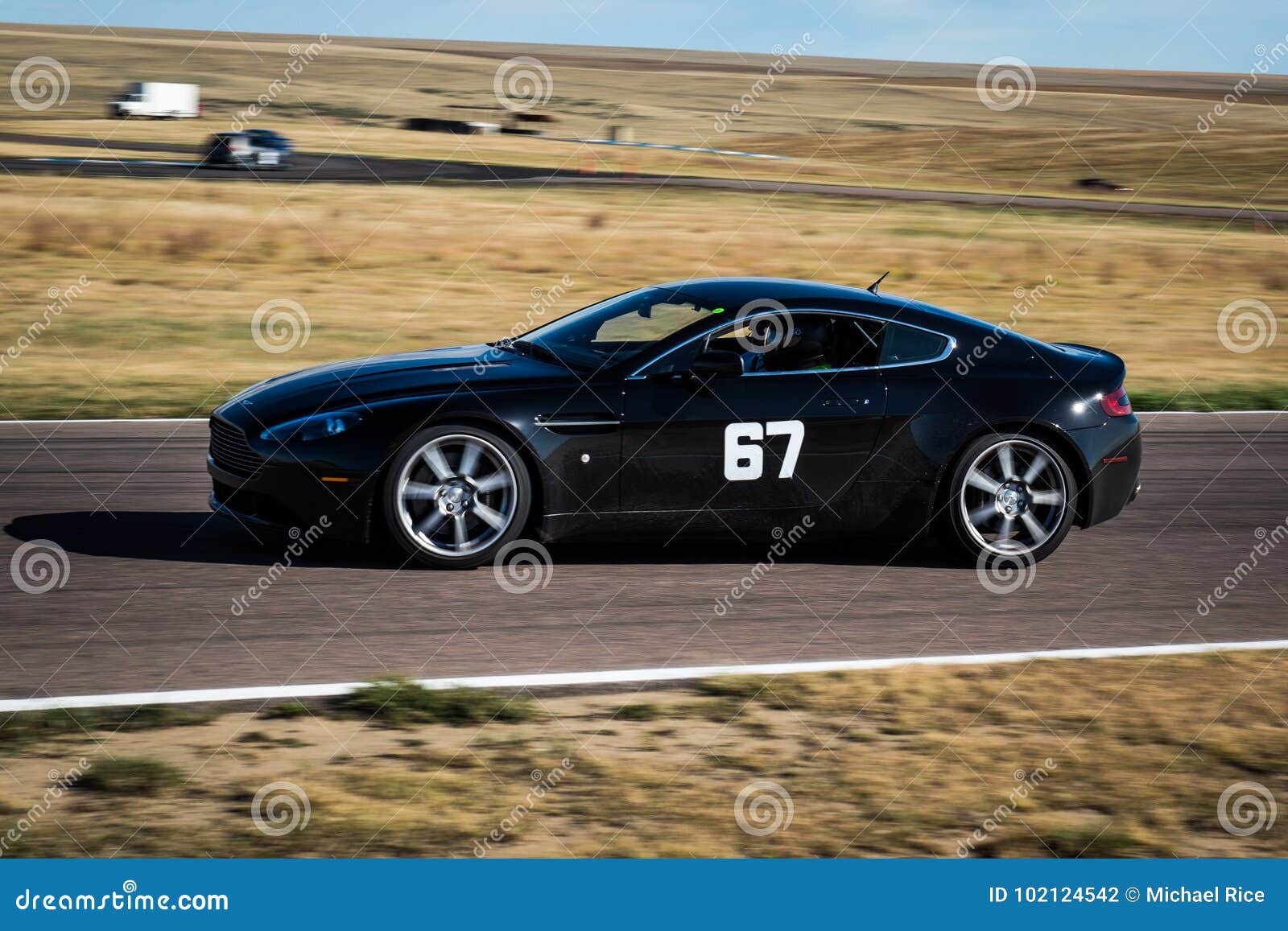 Black race car on track editorial photography. Image of black - 102124542