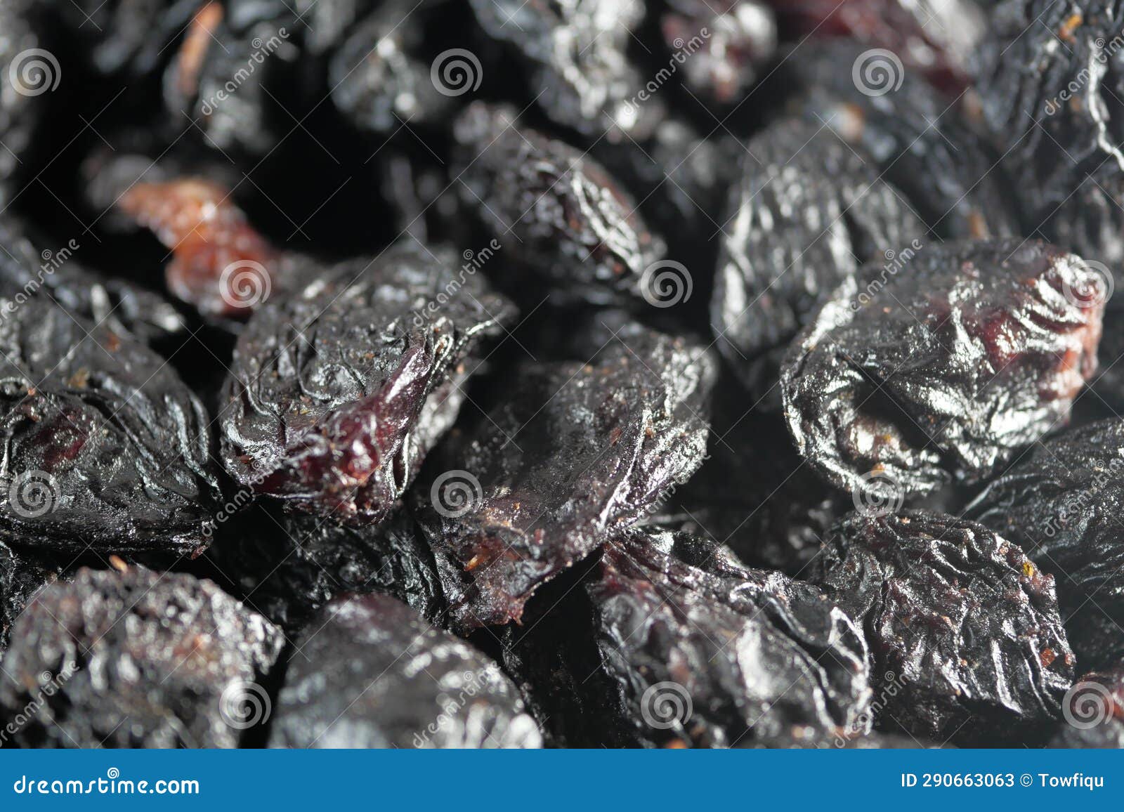 Black Raisin on White Background, Close Up, Stock Image - Image of ...