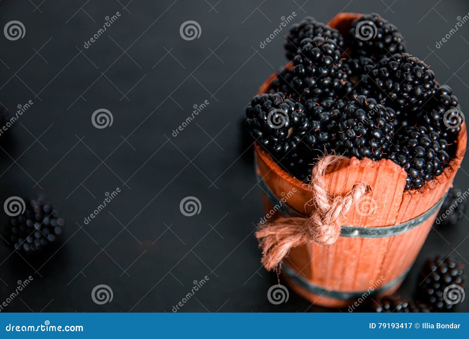 Black Raspberries in a Wooden Basket on Background. Frame. Copy Space ...