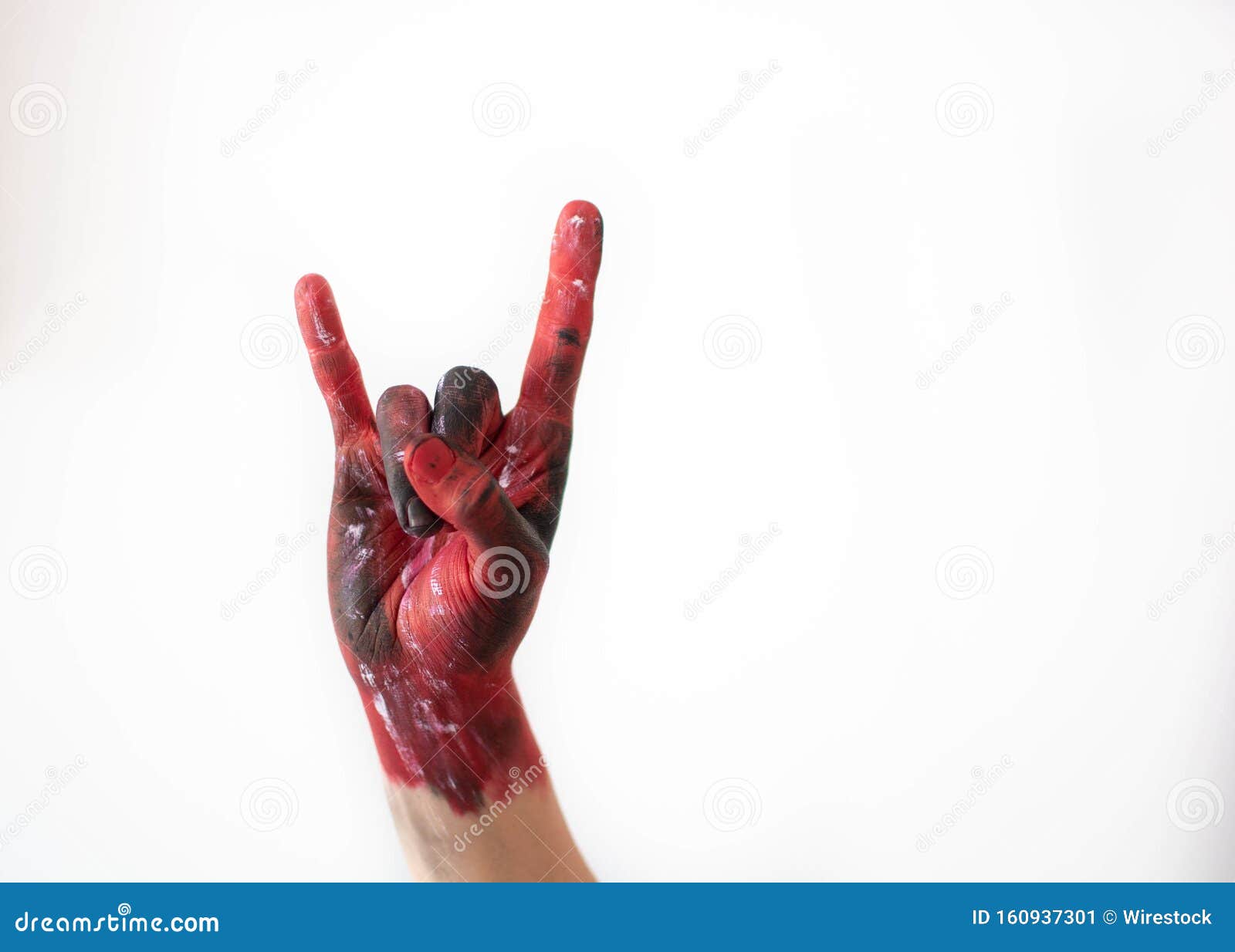 Black and Red Colored Painted Hand Gesturing Shaka Sign on a Gray ...