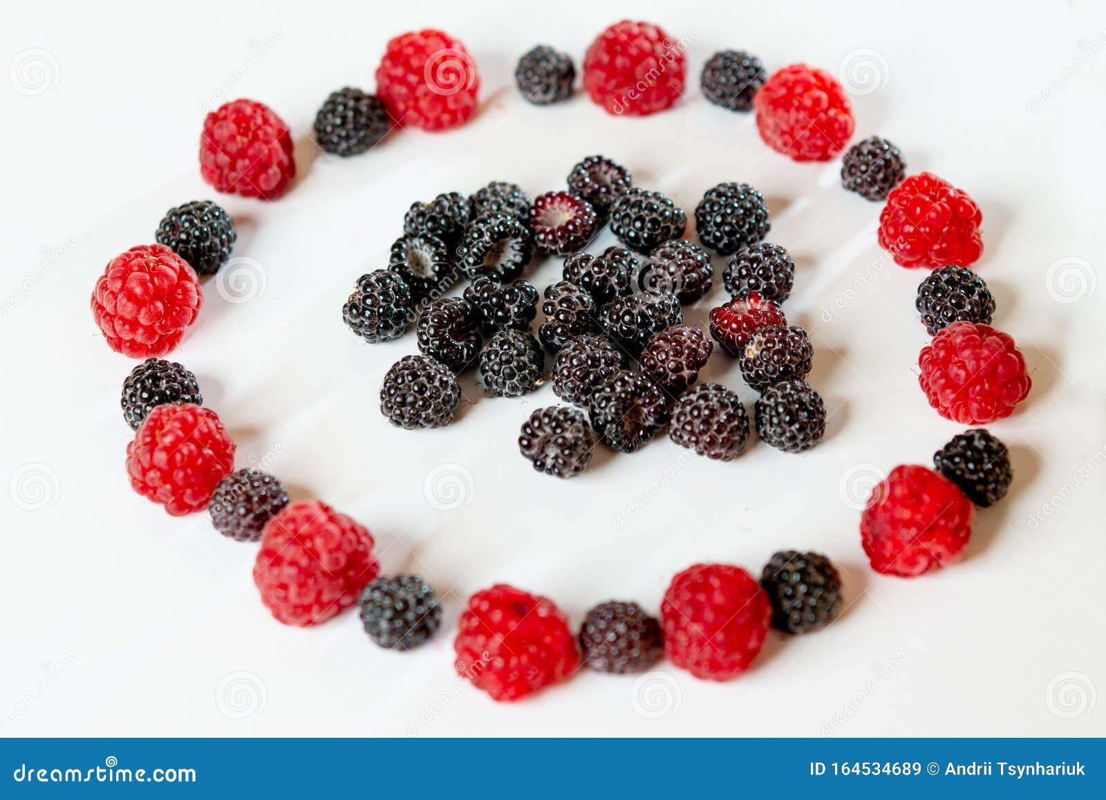 Black and Red Raspberry Composition on a White Background Stock Image ...