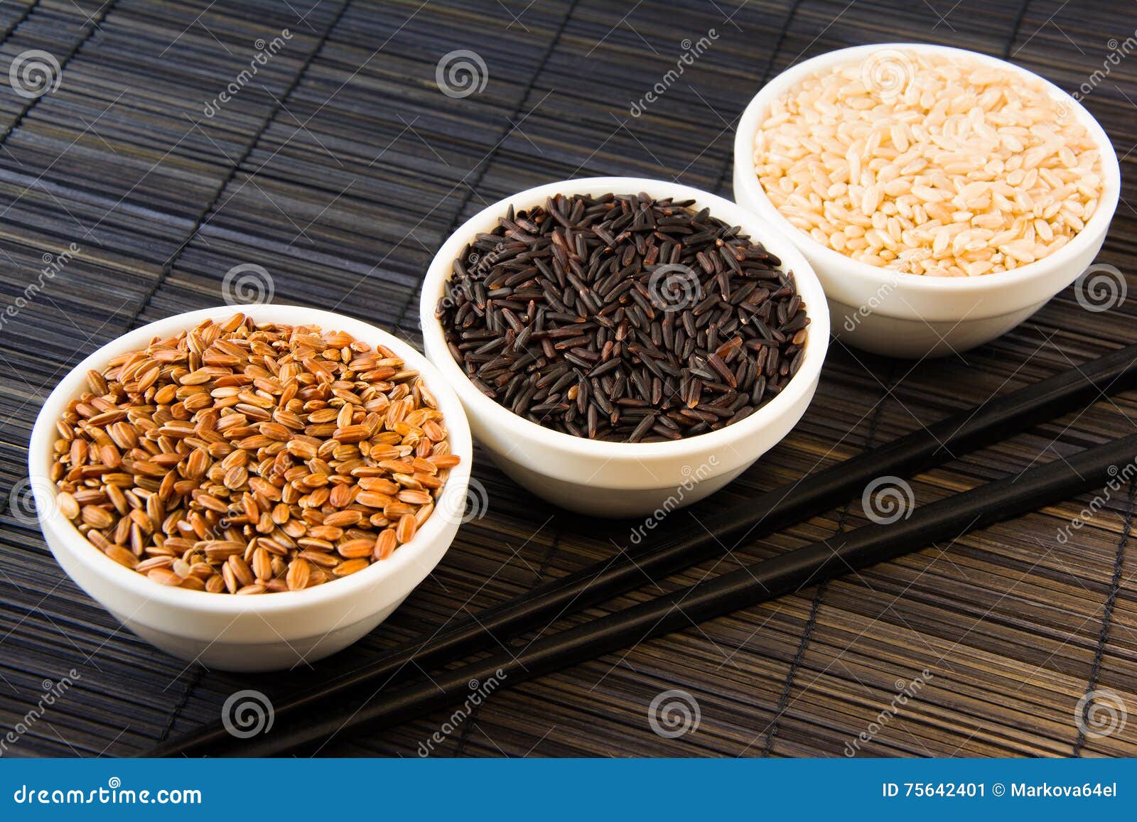 Black, Red and White Unpolished Rice on a Straw Mat Stock Image - Image ...