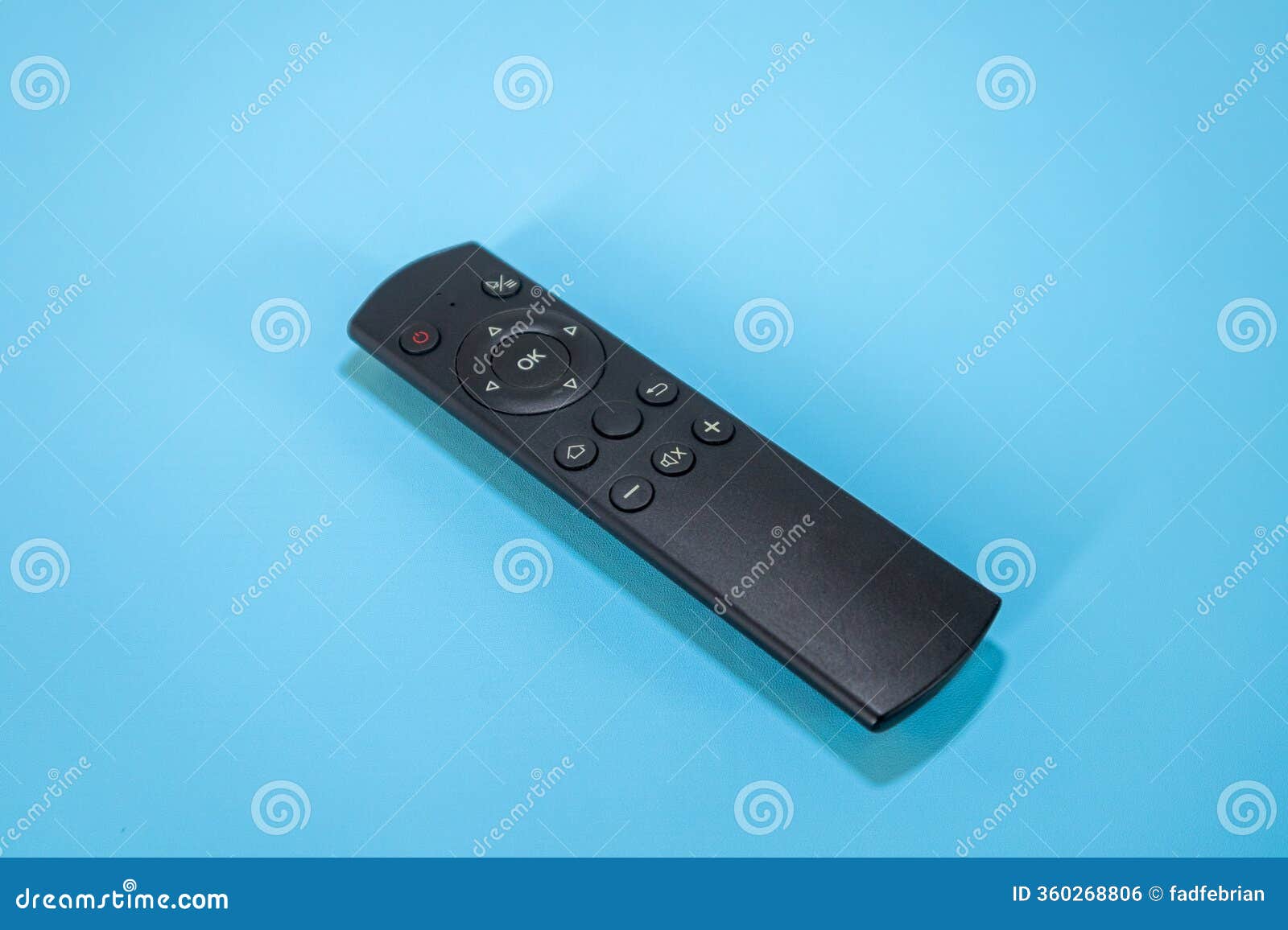 Black Remote Control on Blue Background Stock Photo - Image of object ...