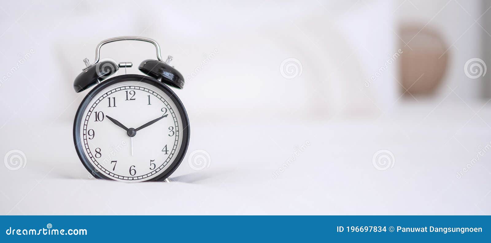 Black Retro Alarm Clock on Bed at Night, Sleeping and daily Routine ...