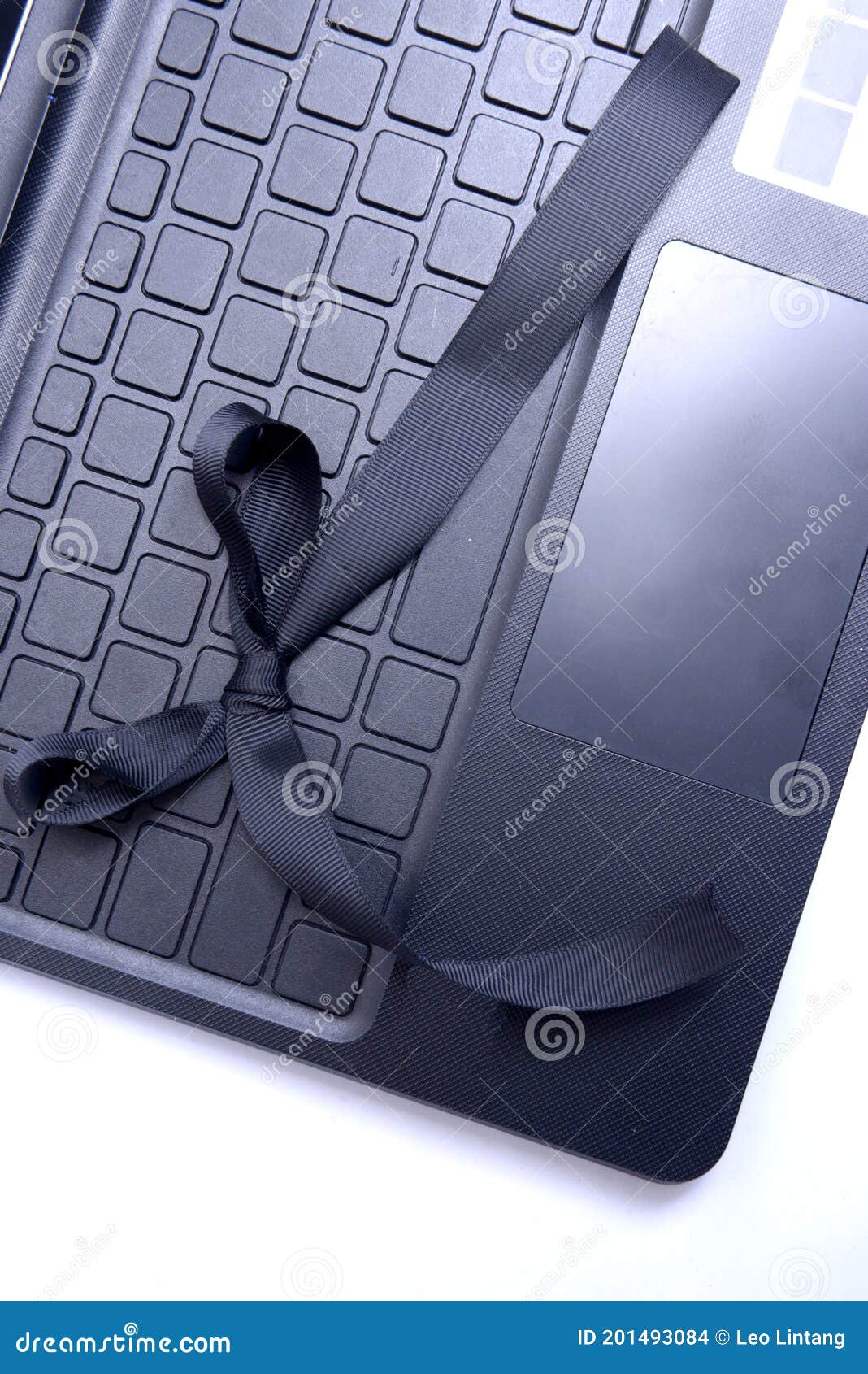 Black ribbon on the laptop stock photo. Image of festive - 201493084