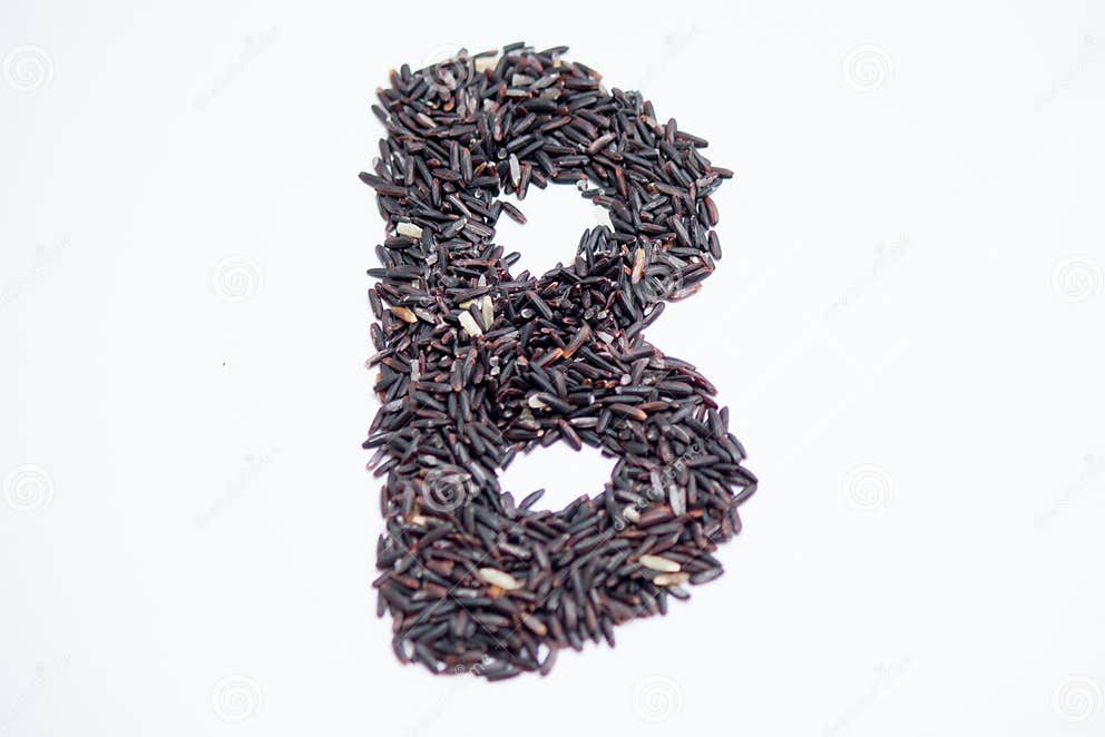 Black rice is a alphabet stock photo. Image of vegetarian - 122785202