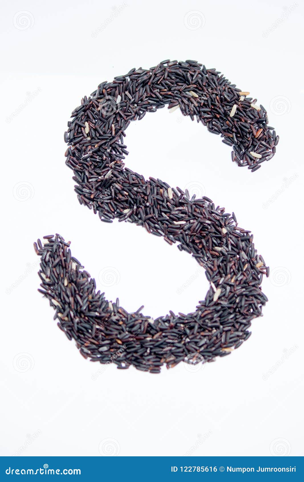 Black rice is a alphabet stock photo. Image of closeup - 122785616