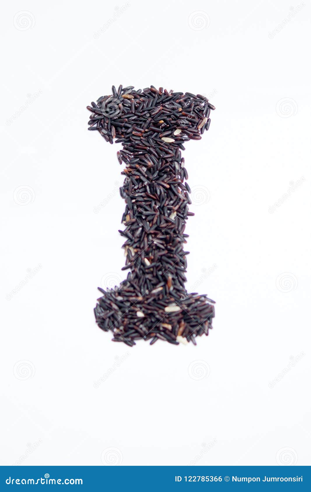 Black rice is a alphabet stock photo. Image of cuisine - 122785366