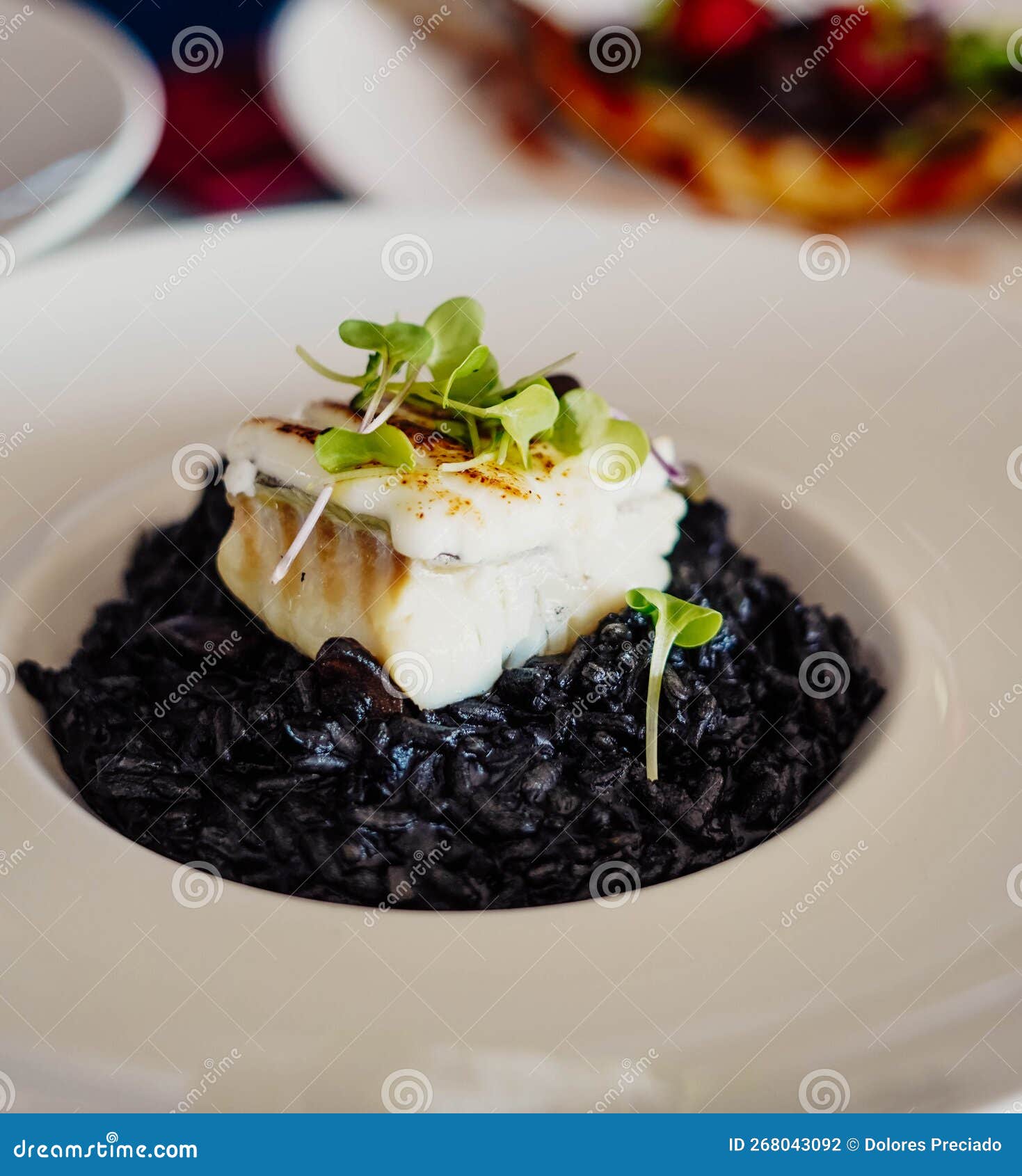 Black Rice with Cuttlefish and Squid Ink Stock Photo - Image of baking ...