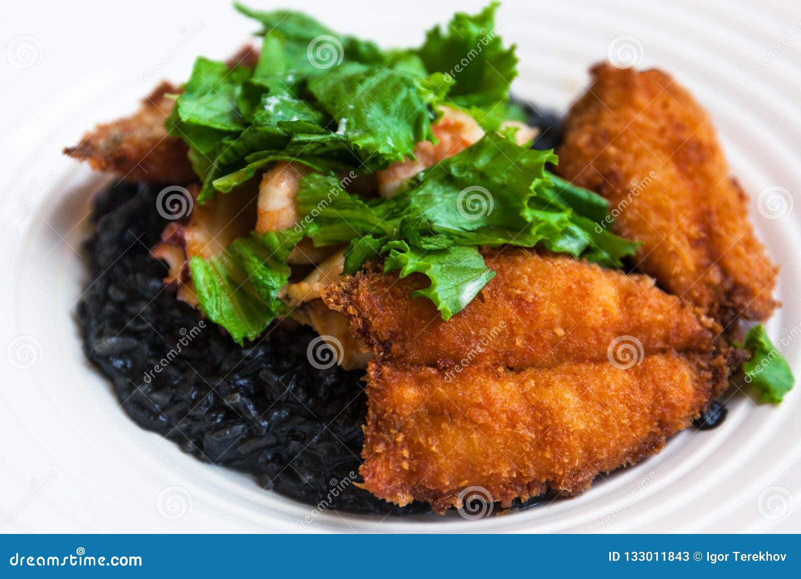 Black rice and fried fish stock image. Image of color - 133011843