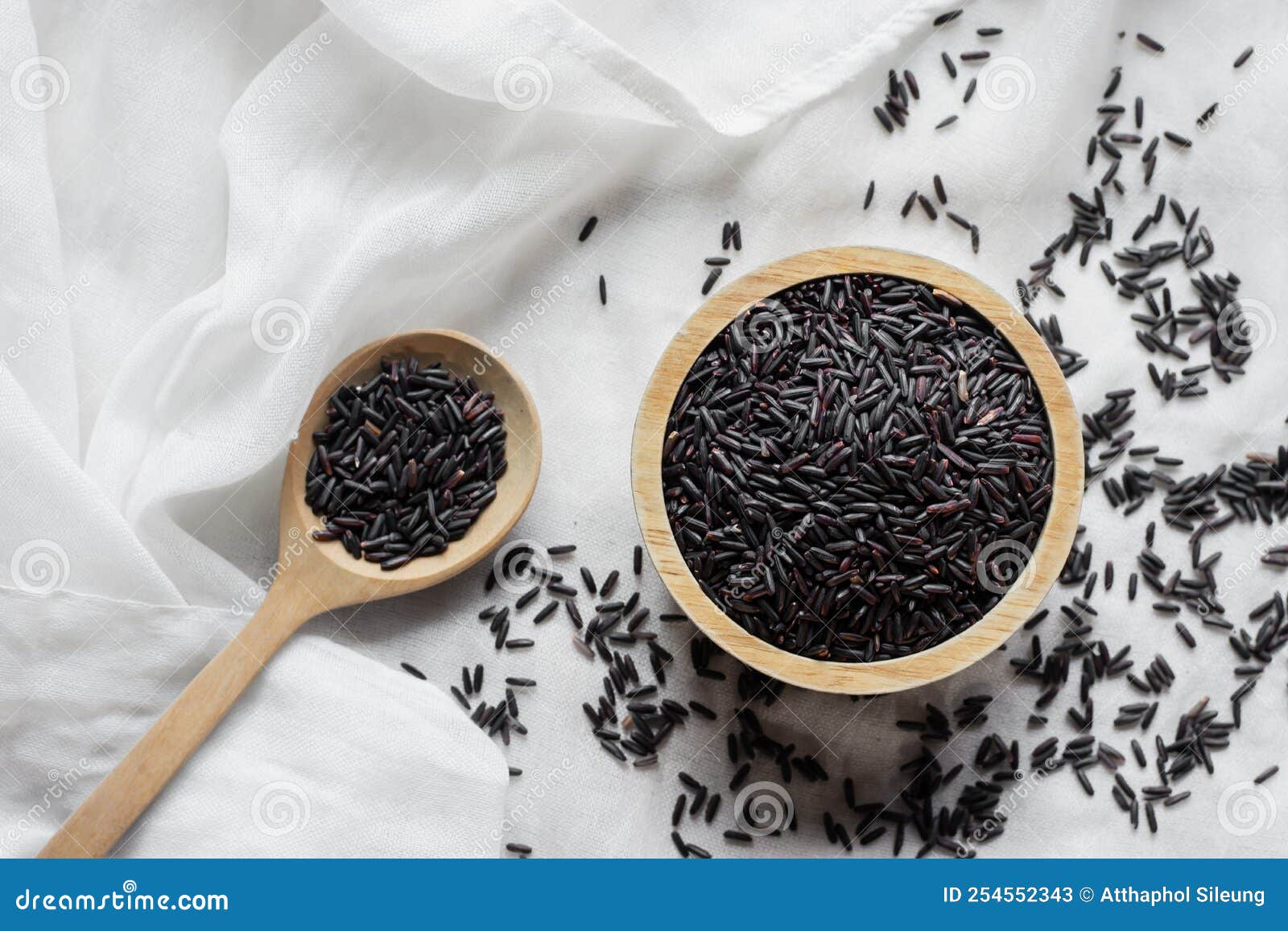 The Black Rice Grains in a Wooden Cup Rested on a White Cloth Stock ...