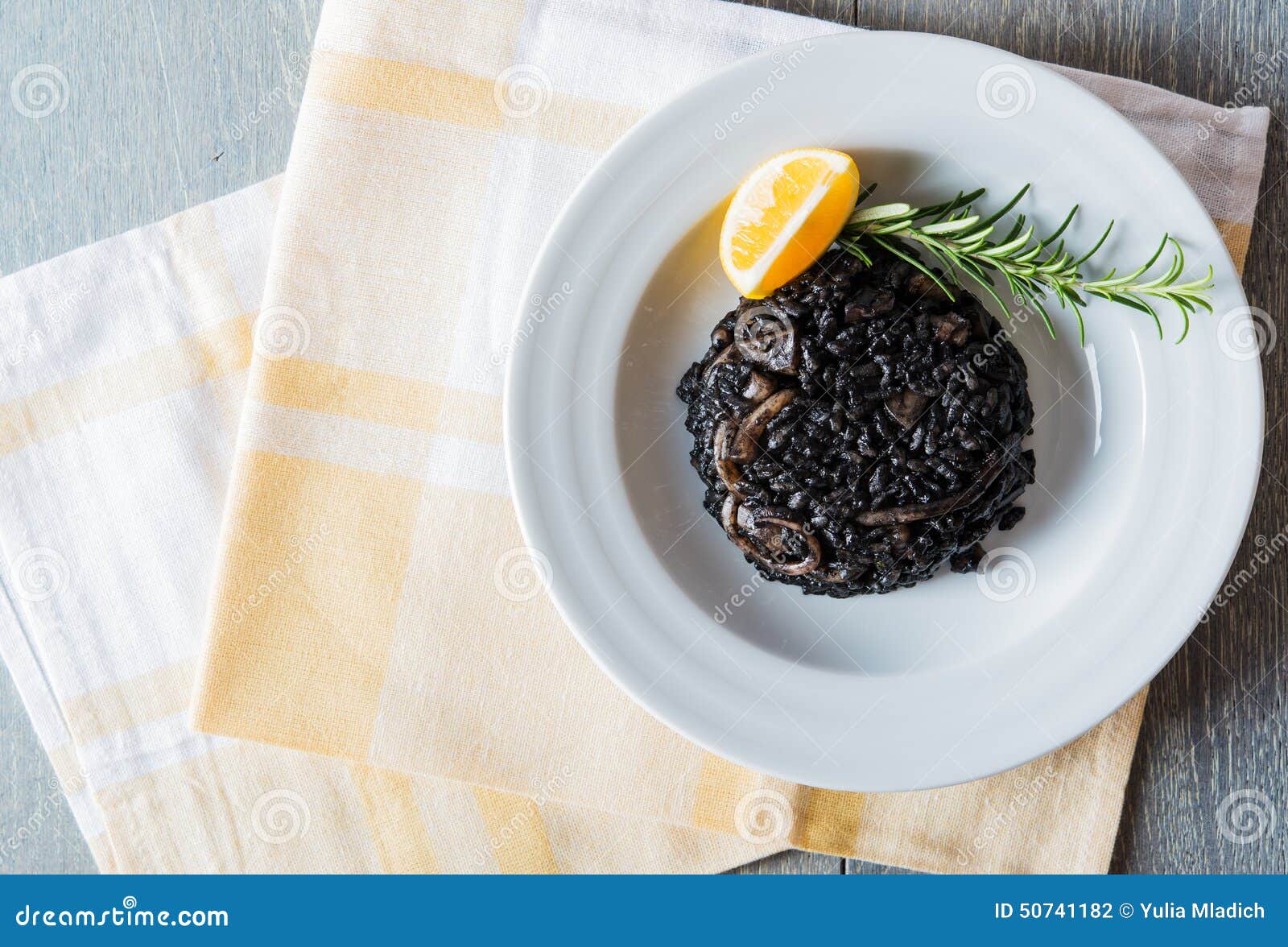 Black risotto with seafood stock photo. Image of meal - 50741182
