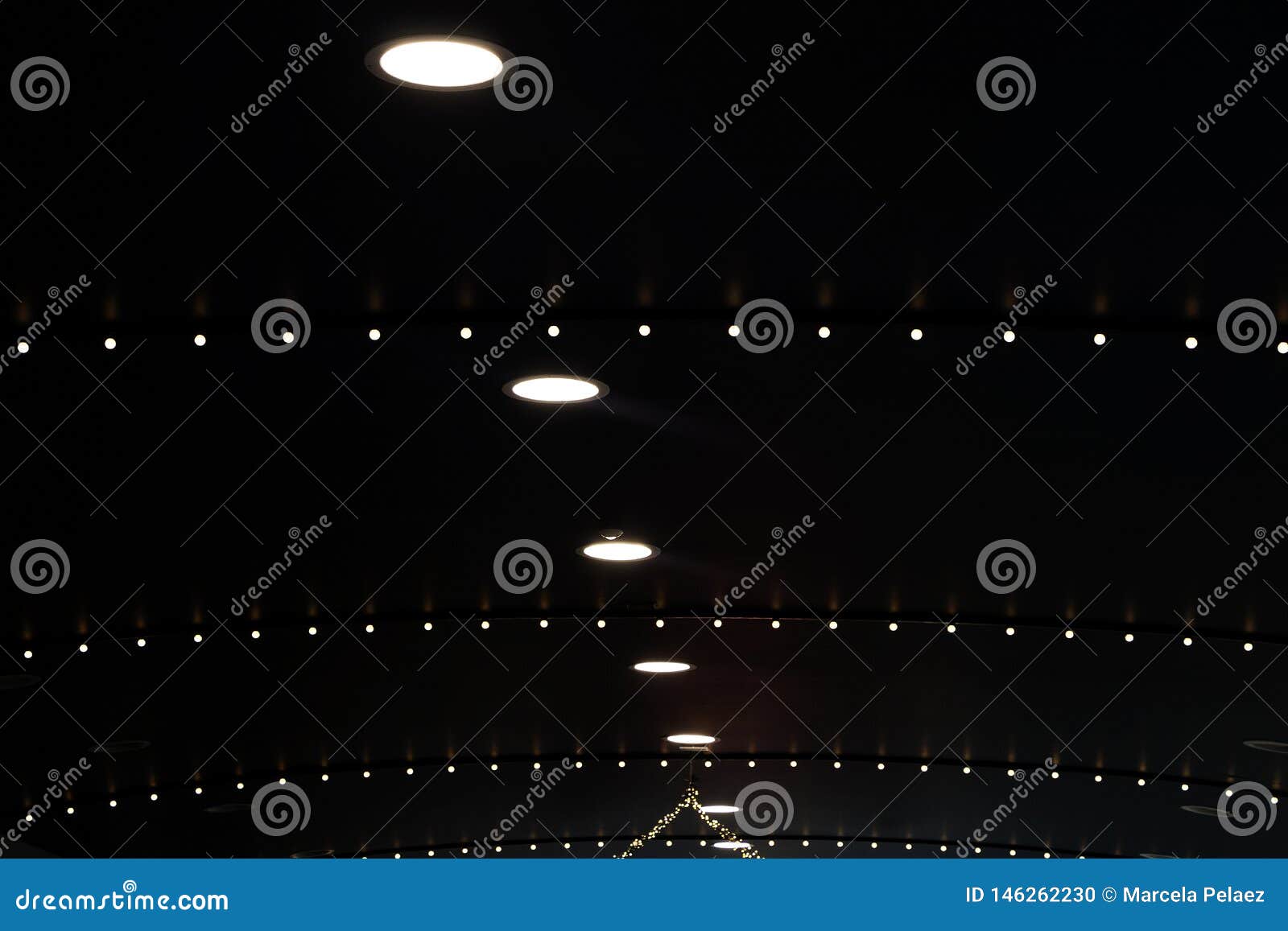 Black Roof with White Circular Lights Embedded and Lines of Smaller ...
