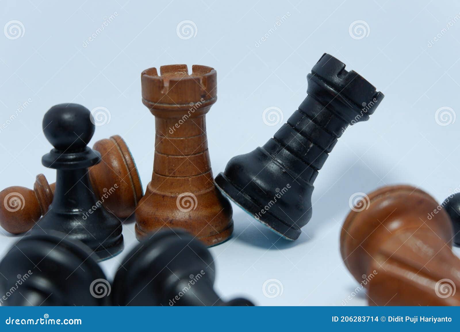 Black Rook Drops White Rook in White Background Stock Photo - Image of ...