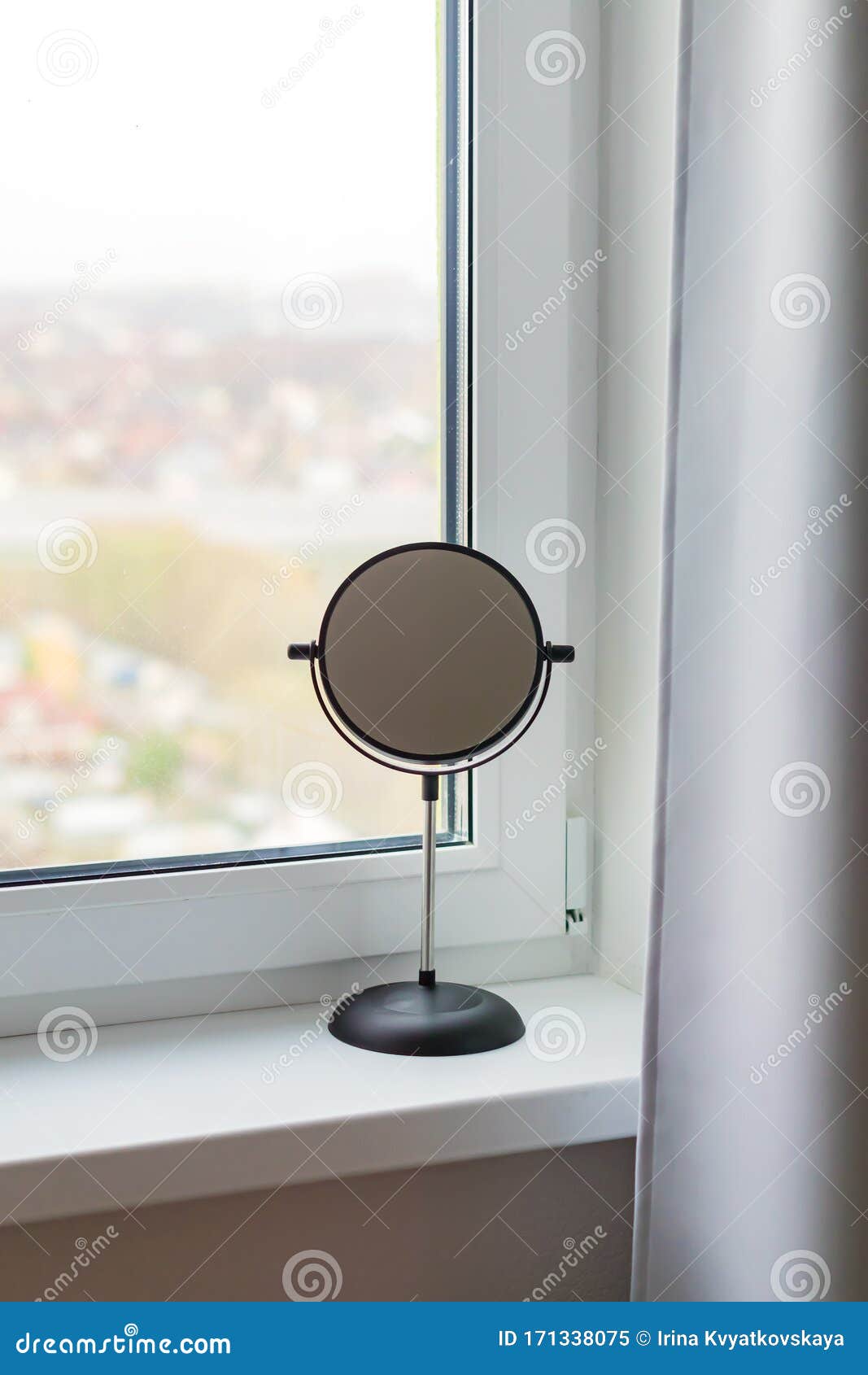 Black Round Make Up Mirror on Window Sill Stock Image - Image of black ...