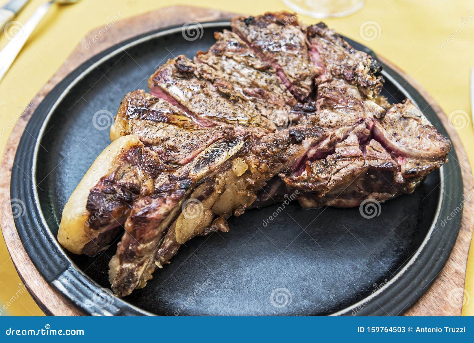 Black Round Plate with Cut Grilled T-bone Steak Stock Image - Image of ...