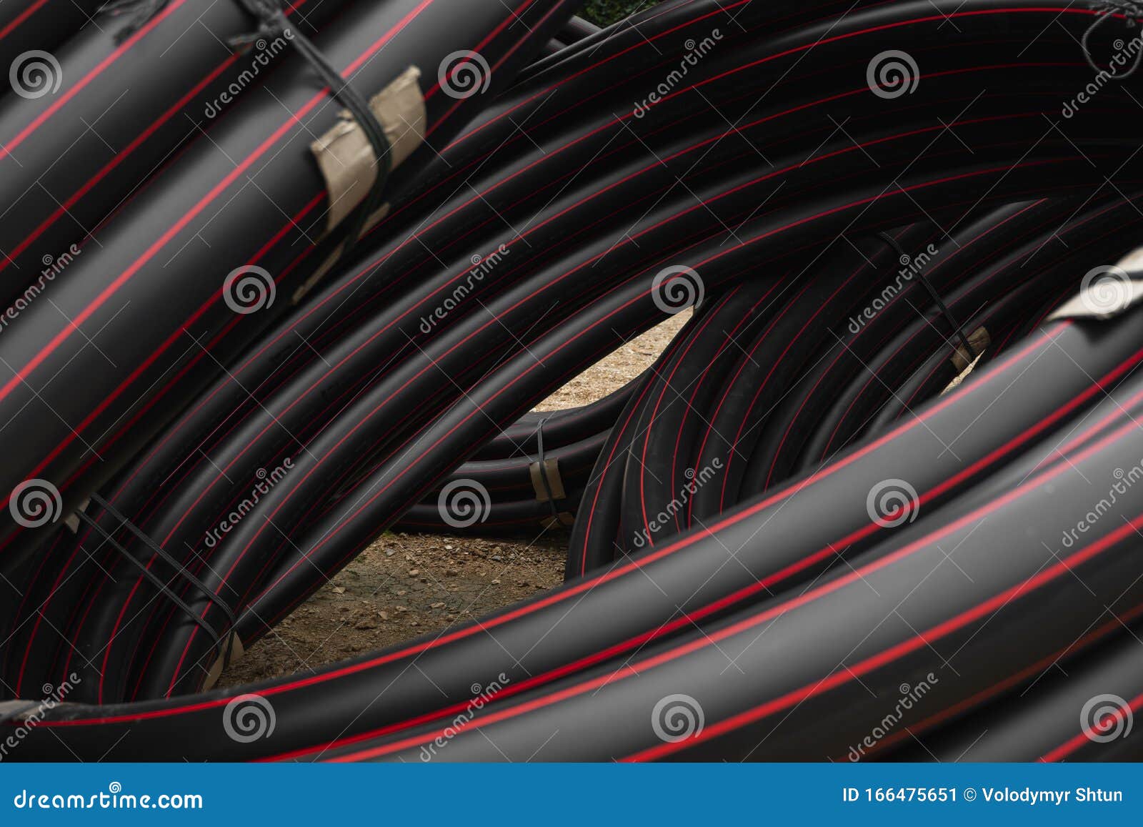 Black Rubber or Plastic Pipes with a Red Lines As a Construction ...