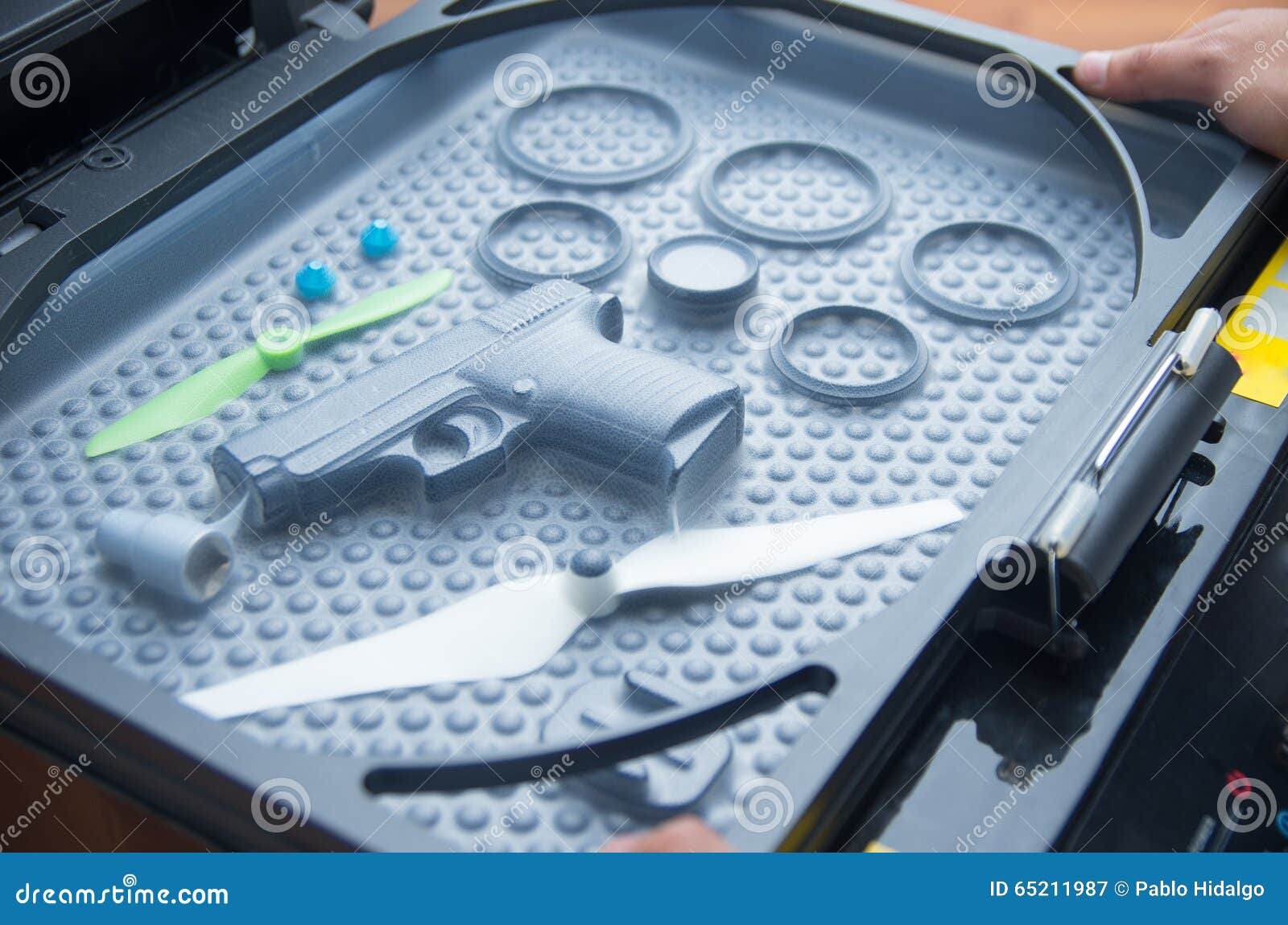 Black Rubber Rings, Toy Gun and Small Propellers Stock Image - Image of ...