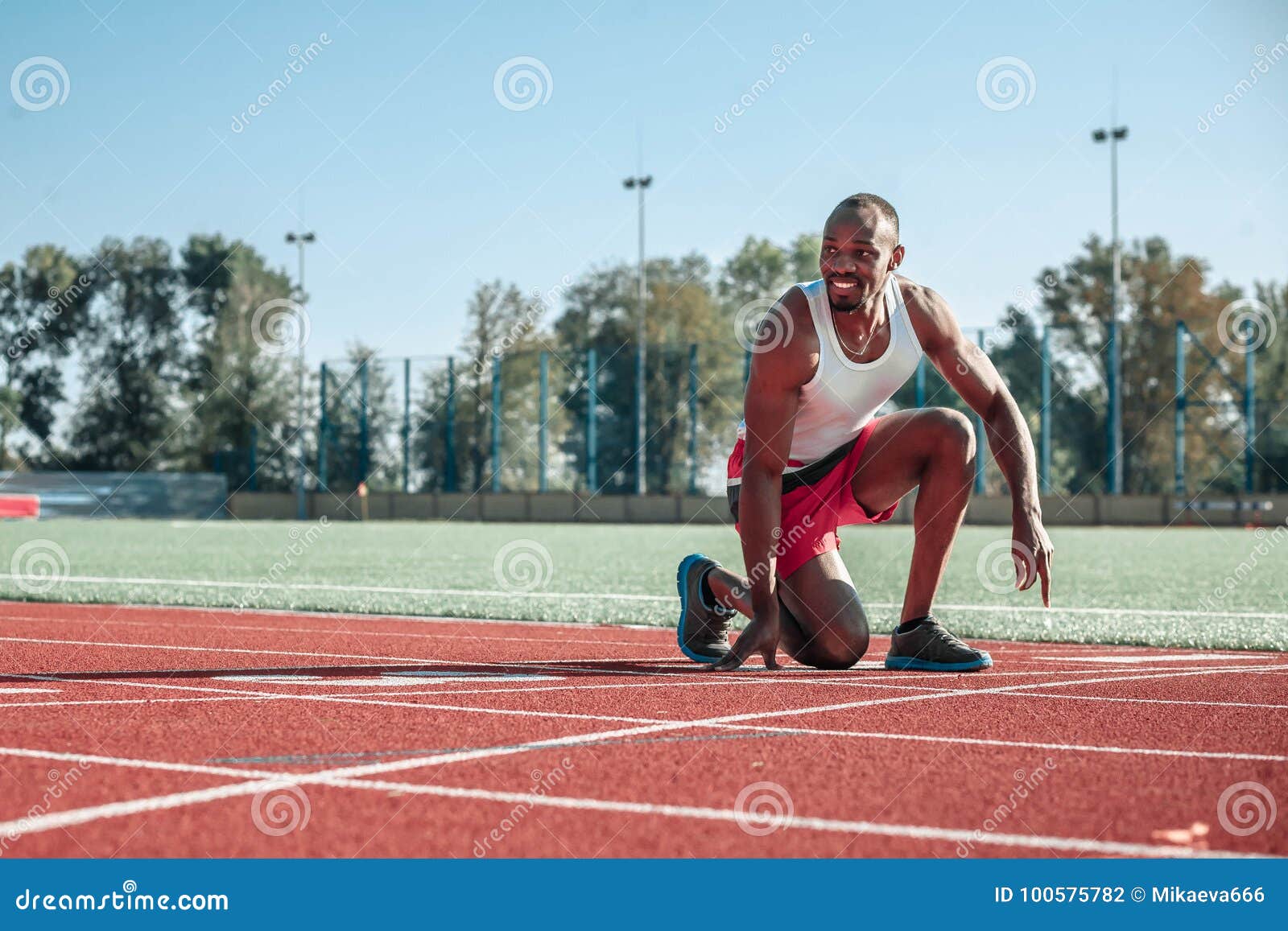 Black Runner in Position at Start Stock Photo - Image of athletic ...