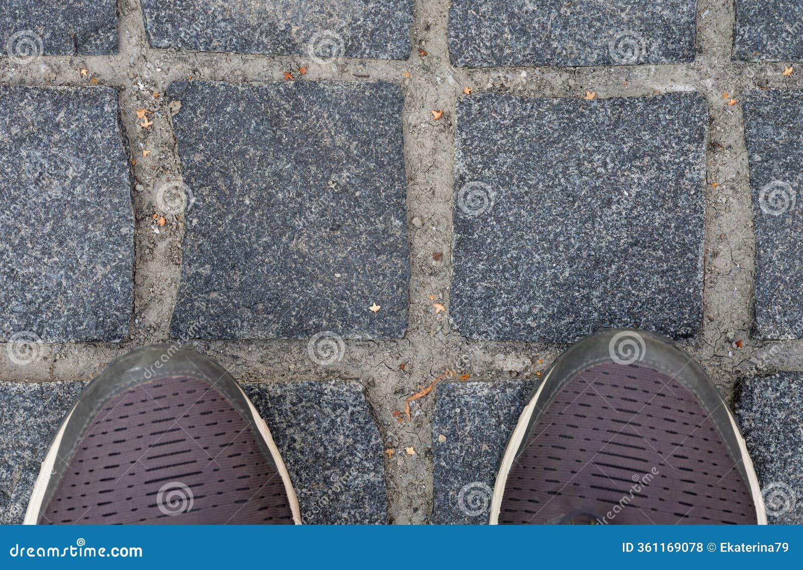 Black Running Shoes Standing on Gray Granite Blocks Background. Stock ...