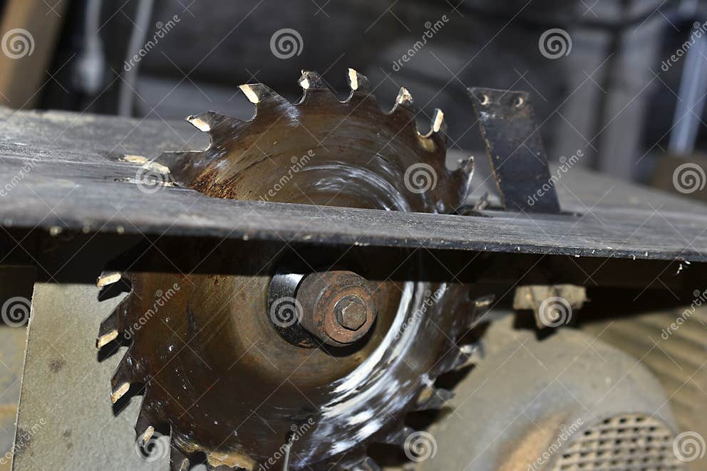 A Black Rusty Circular Saw in the Garage Stock Image - Image of board ...