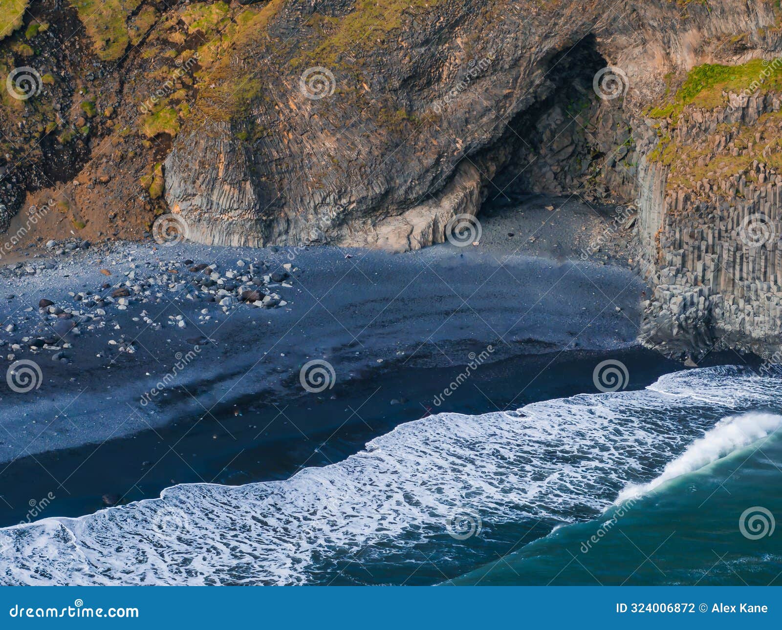 Black Sand Beach with Basalt Columns and Cliffside Cave in Iceland ...