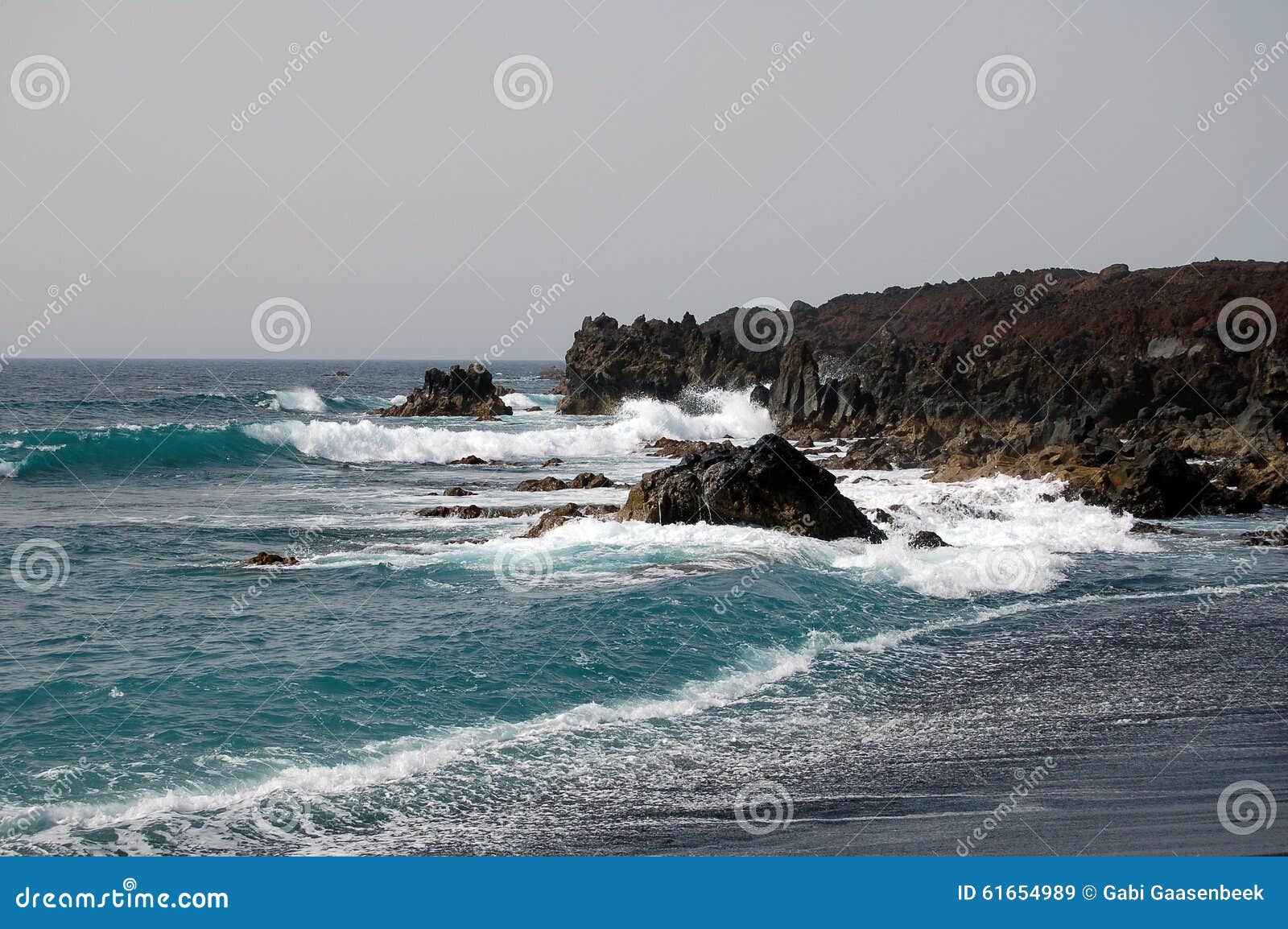 Black Sand Beach with Rocks and Waves Stock Image - Image of sand ...