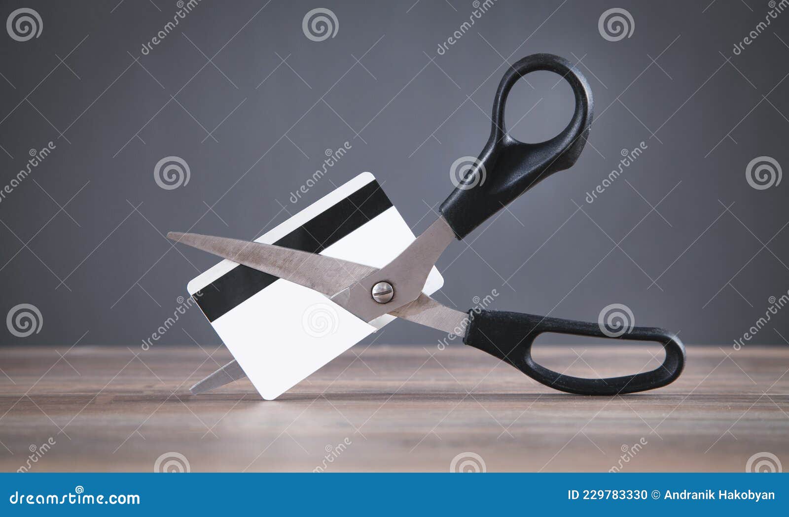 Black Scissors Cutting a Credit Card Stock Photo - Image of financial ...