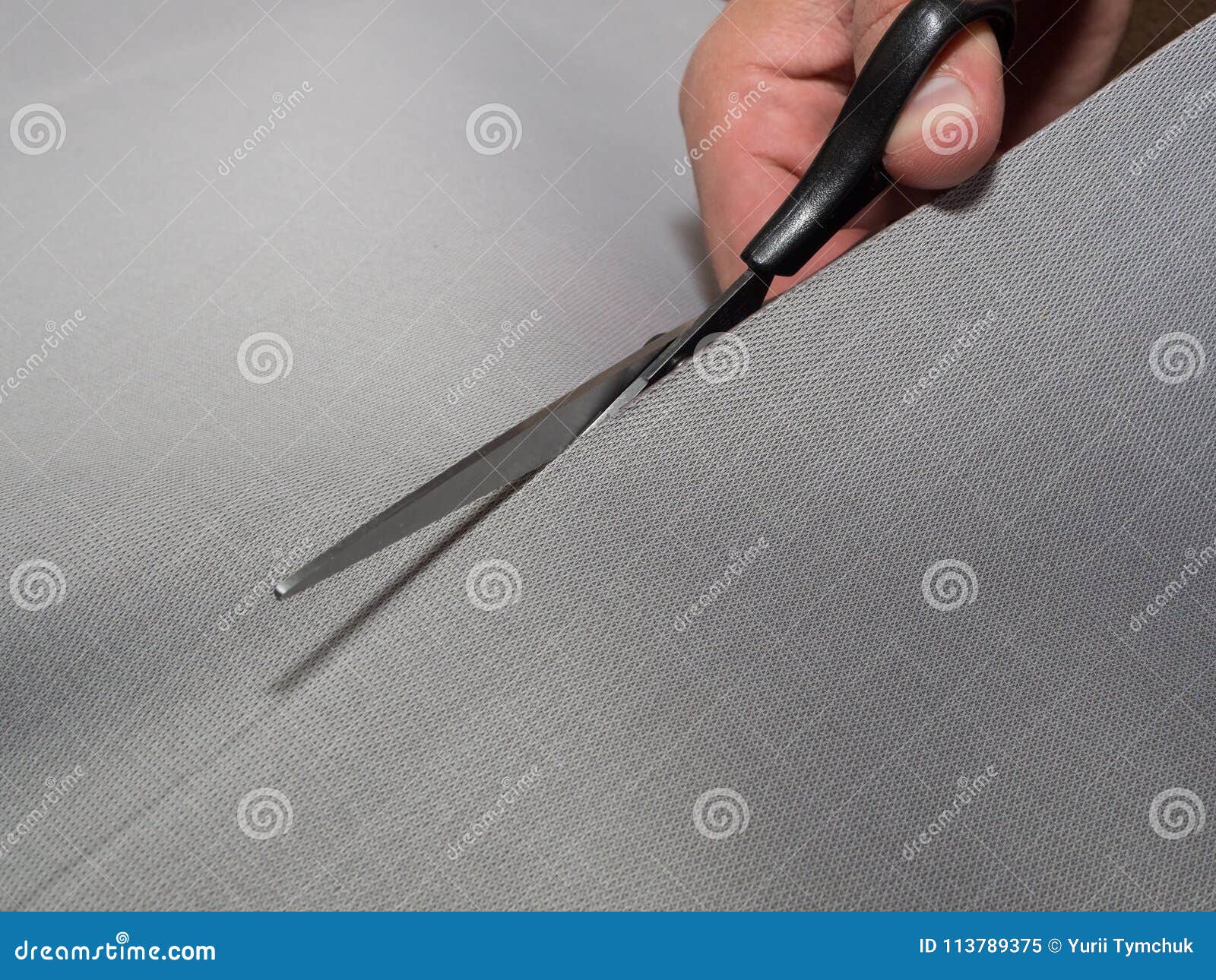 Black Scissors Cutting Fabric. Concept of Textile Cutting-out Stock ...