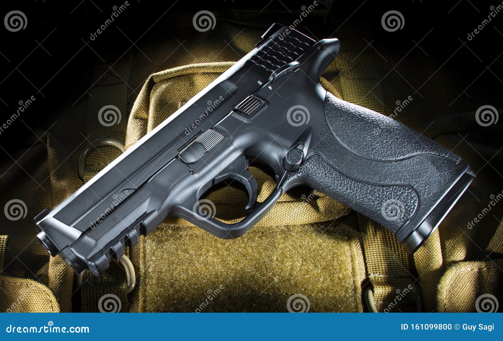 Semi Auto Handgun on Tan Material Stock Photo - Image of concealed ...