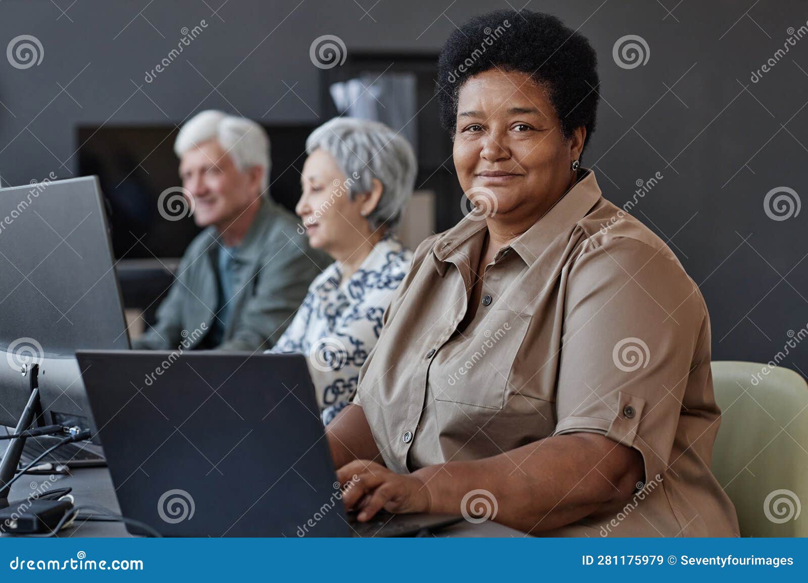 Black Senior Woman in Computer Class for Elderly Smiling at Camera ...