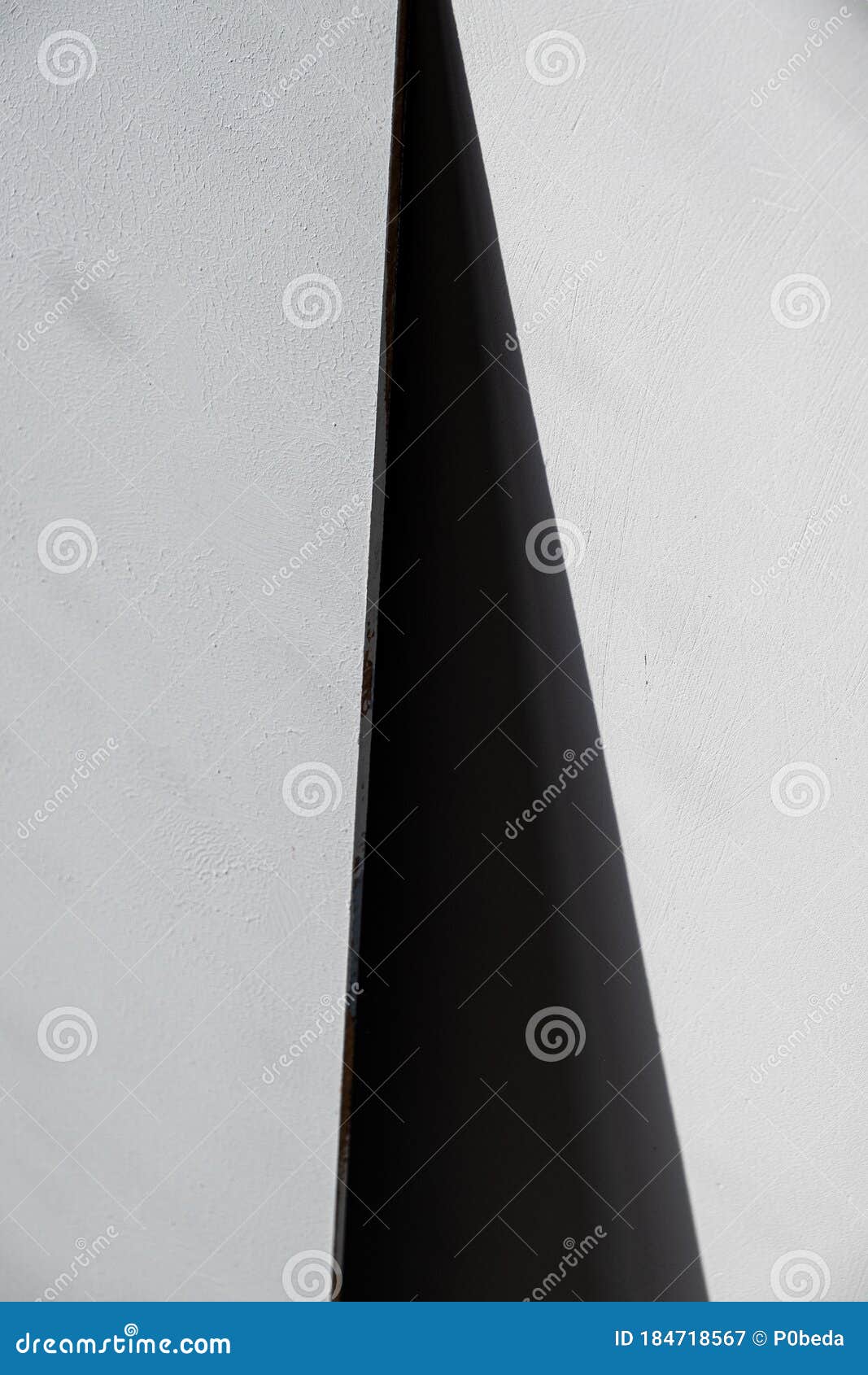Black Shadow in the Form of a Triangle on a Concrete Wall Stock Image ...
