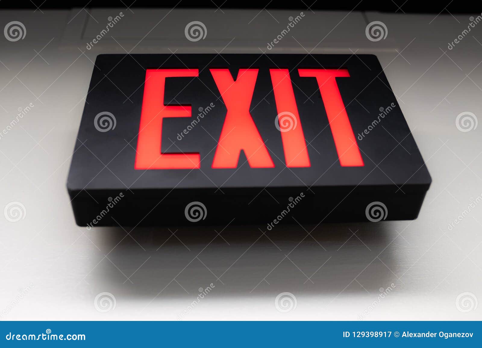 Black Sign that Reads EXIT in Red Letters Stock Image - Image of white ...