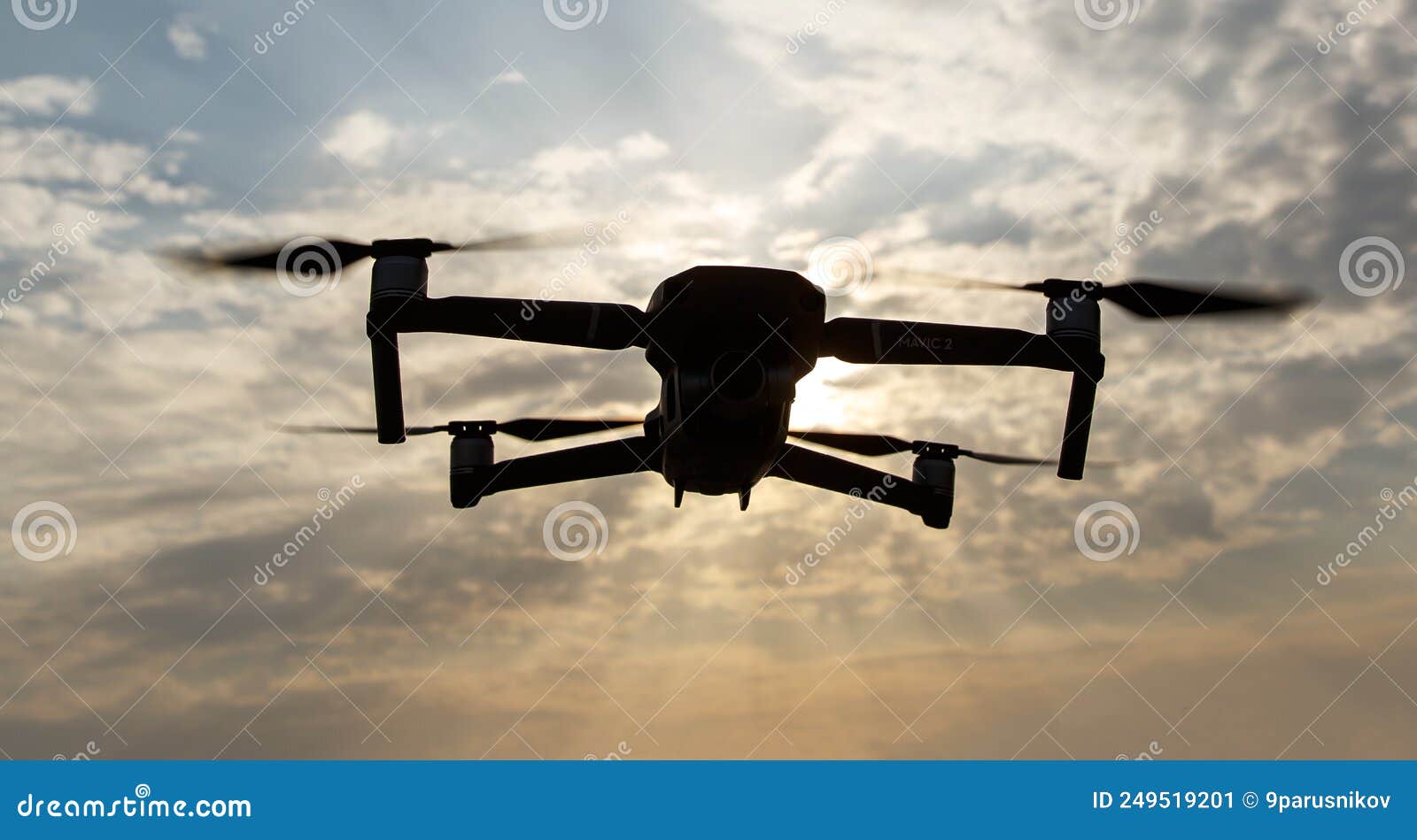 Black Silhouette of a Foldable Drone Flying in the Sky. Stock Image ...