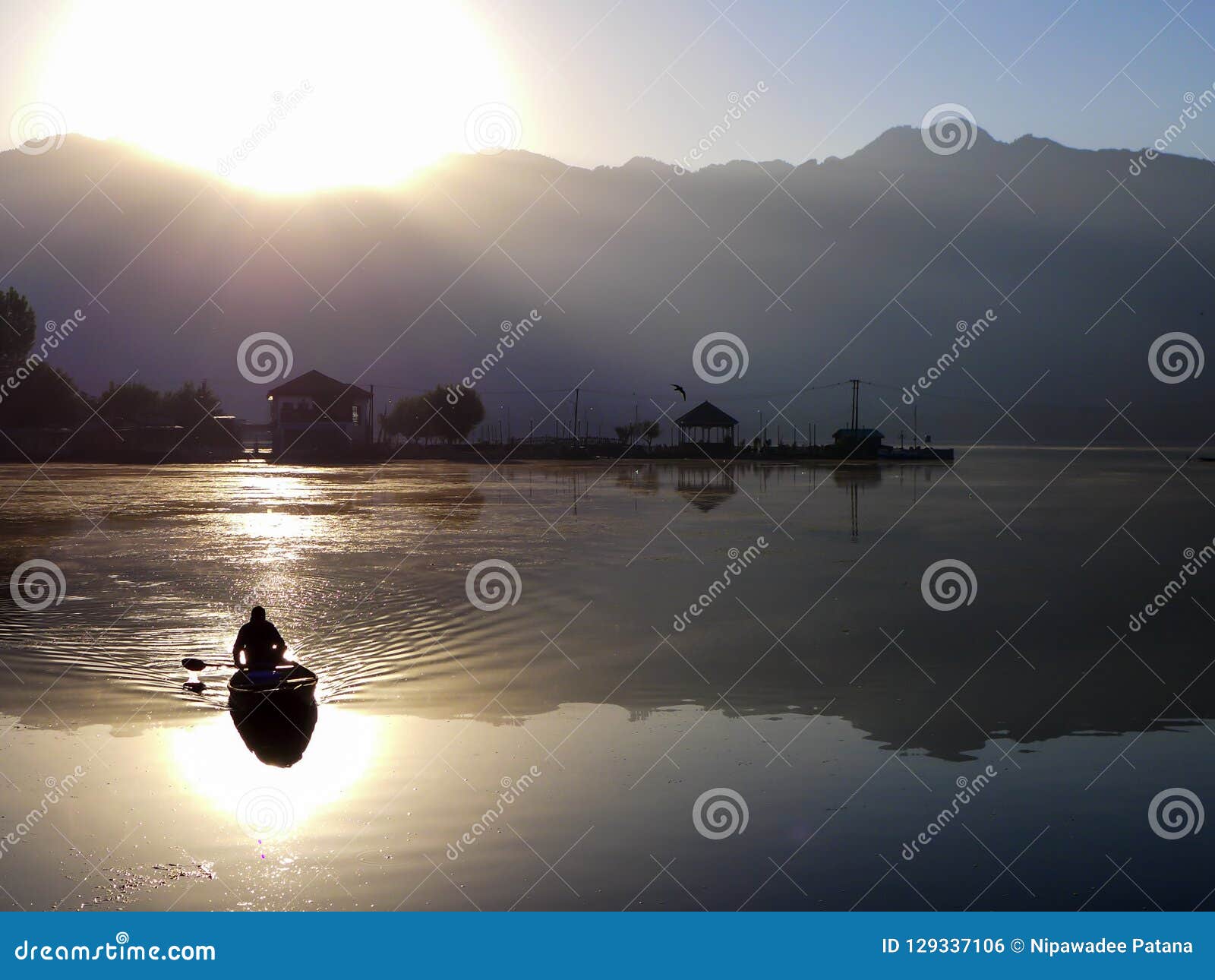 Black Silhouette - The Man Rowing In The River At Sunrise Stock ...