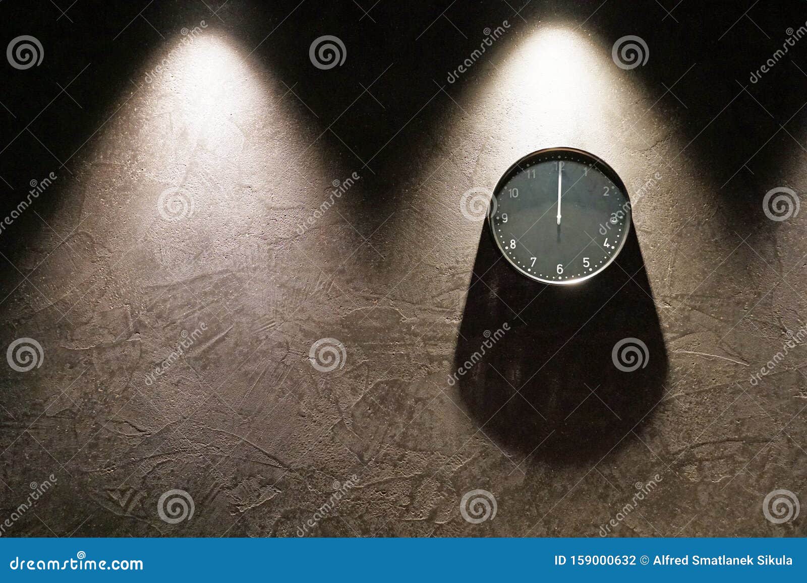 Black Simple Analog Clock Showing Midnight Hanging on the Wall with ...
