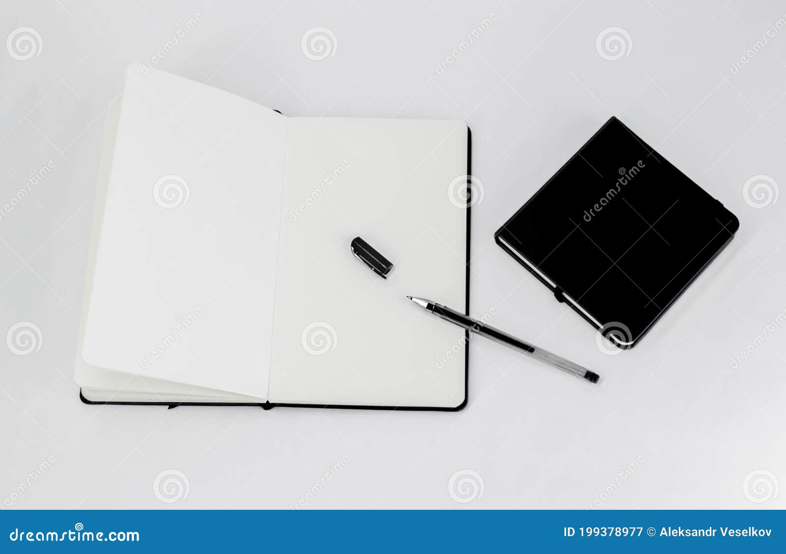 Black Small Closed Square Notepad and Large Open Notebook with Blank ...