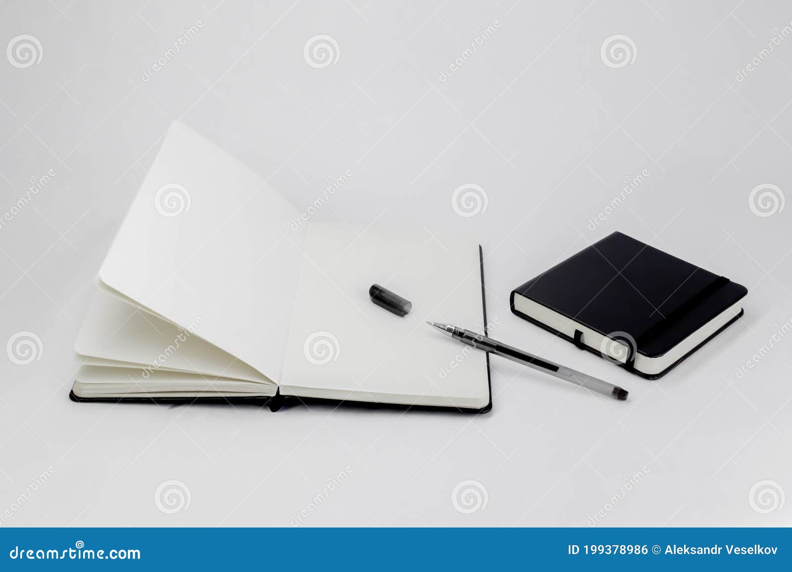 Black Small Closed Square Notepad and Large Open Notebook with Blank ...
