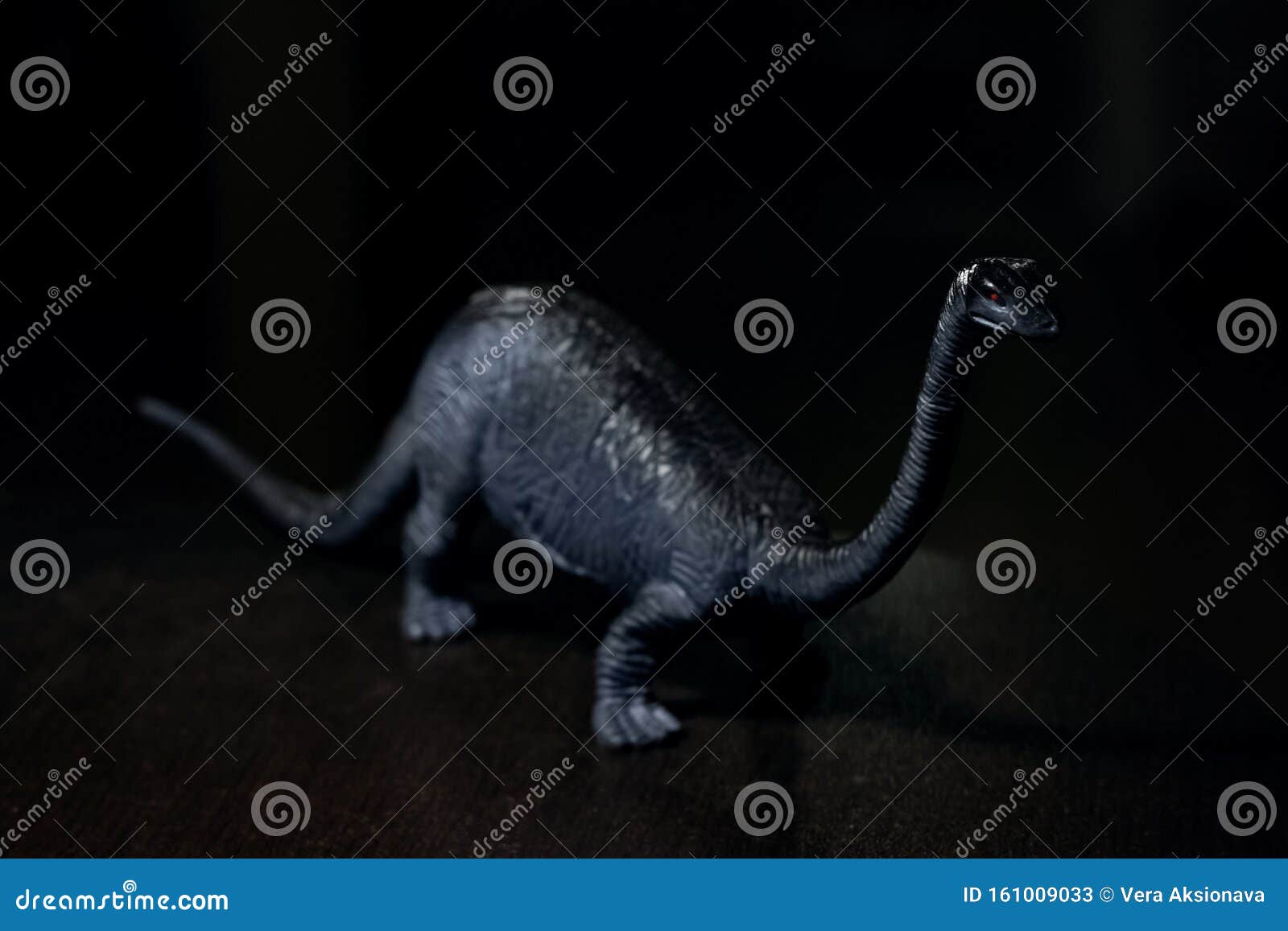 Black Small Dinosaur in Darkness, Non-existent Animal Stock Image ...
