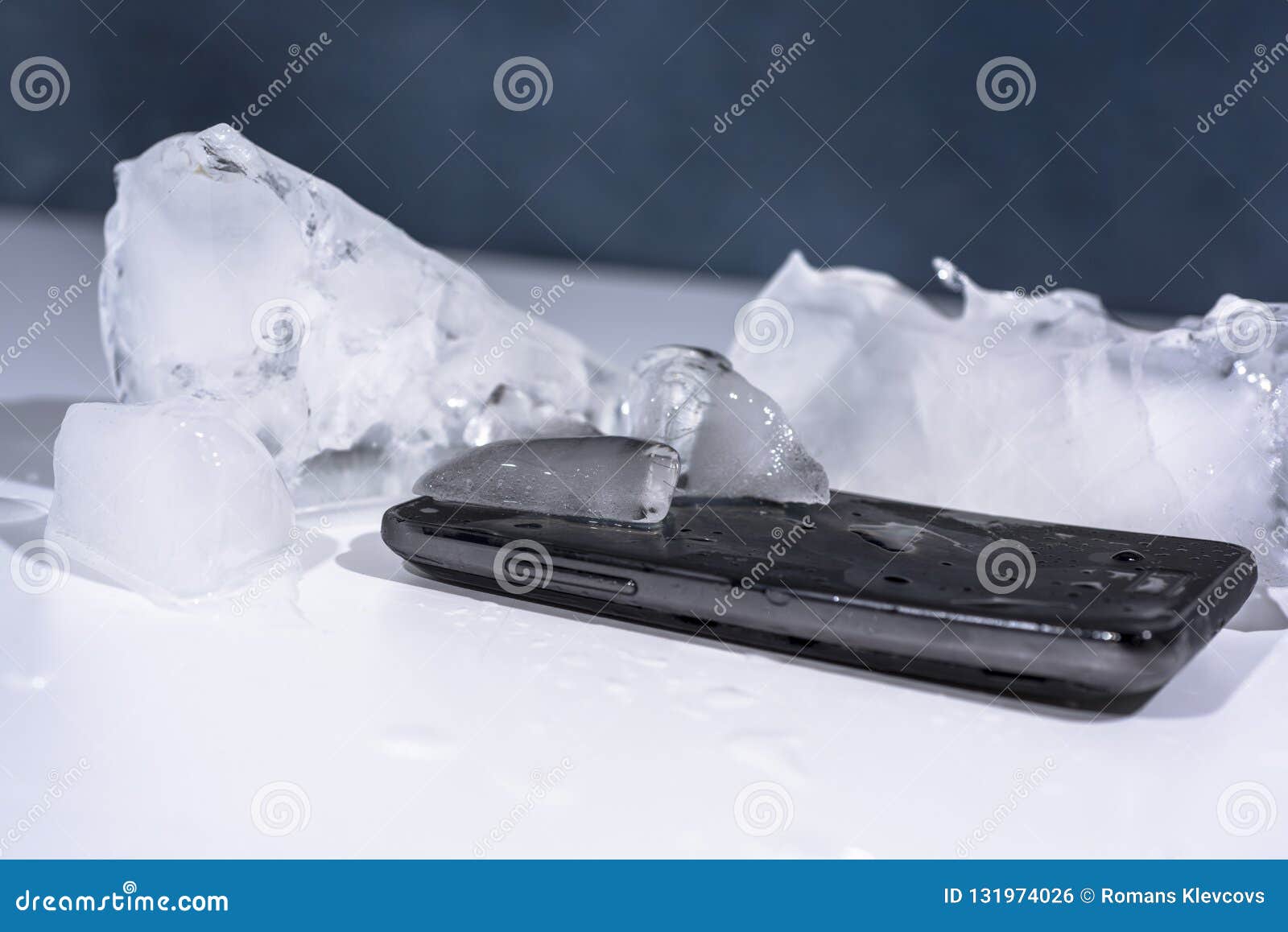 Black Smartphone Frozen in Ice. Abstract Object Photo Stock Photo ...