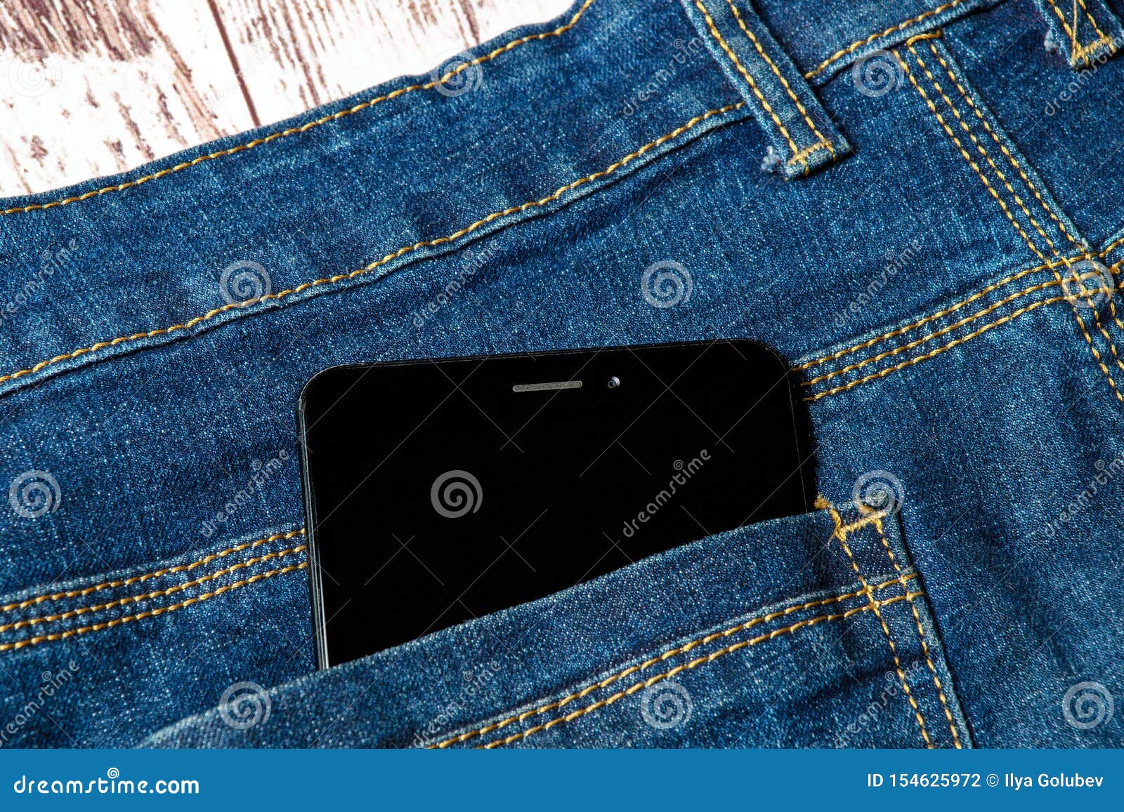 Black Smartphone Sticking Out of His Jeans Pocket Stock Photo - Image ...