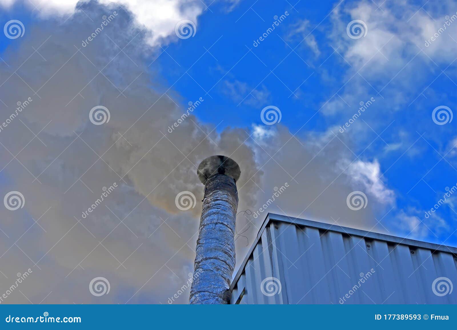 Black Smog from High Industrial Pipe with Silver Insolation on Blue Sky ...