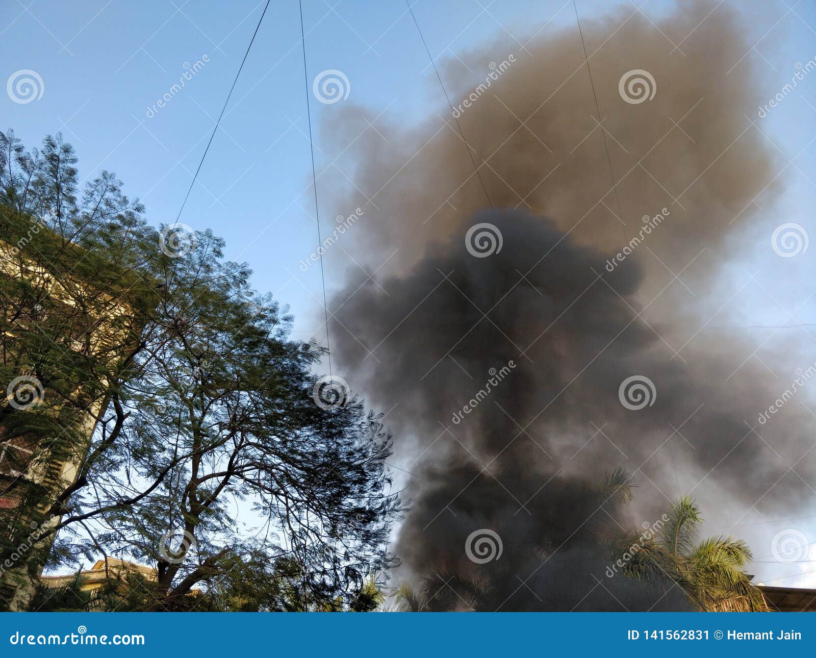 Black Smoke Coming Out of a Building on Fire Stock Image - Image of ...