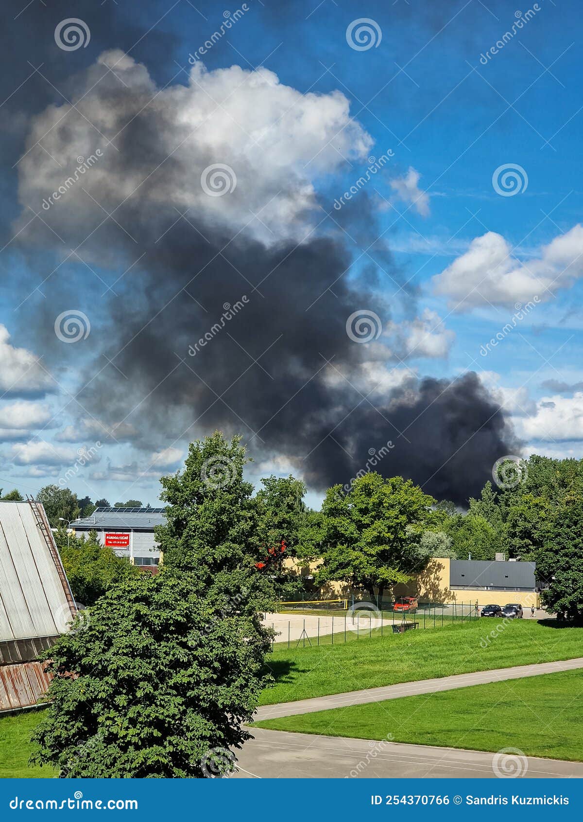 Black Smoke from the Fire Can Be Seen in the Distance Stock Photo ...