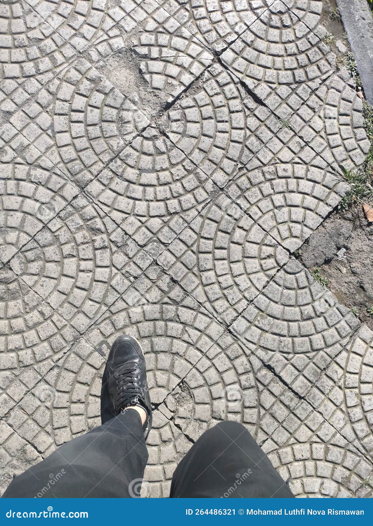 Broken Sidewalk Curb With Exposed Rebar And Jagged Edges That Could ...