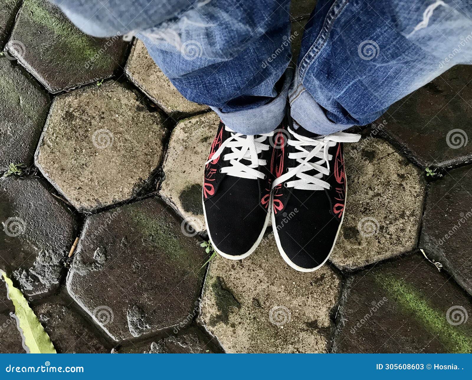 Sneakers worn by men stock image. Image of yard, worn - 305608603